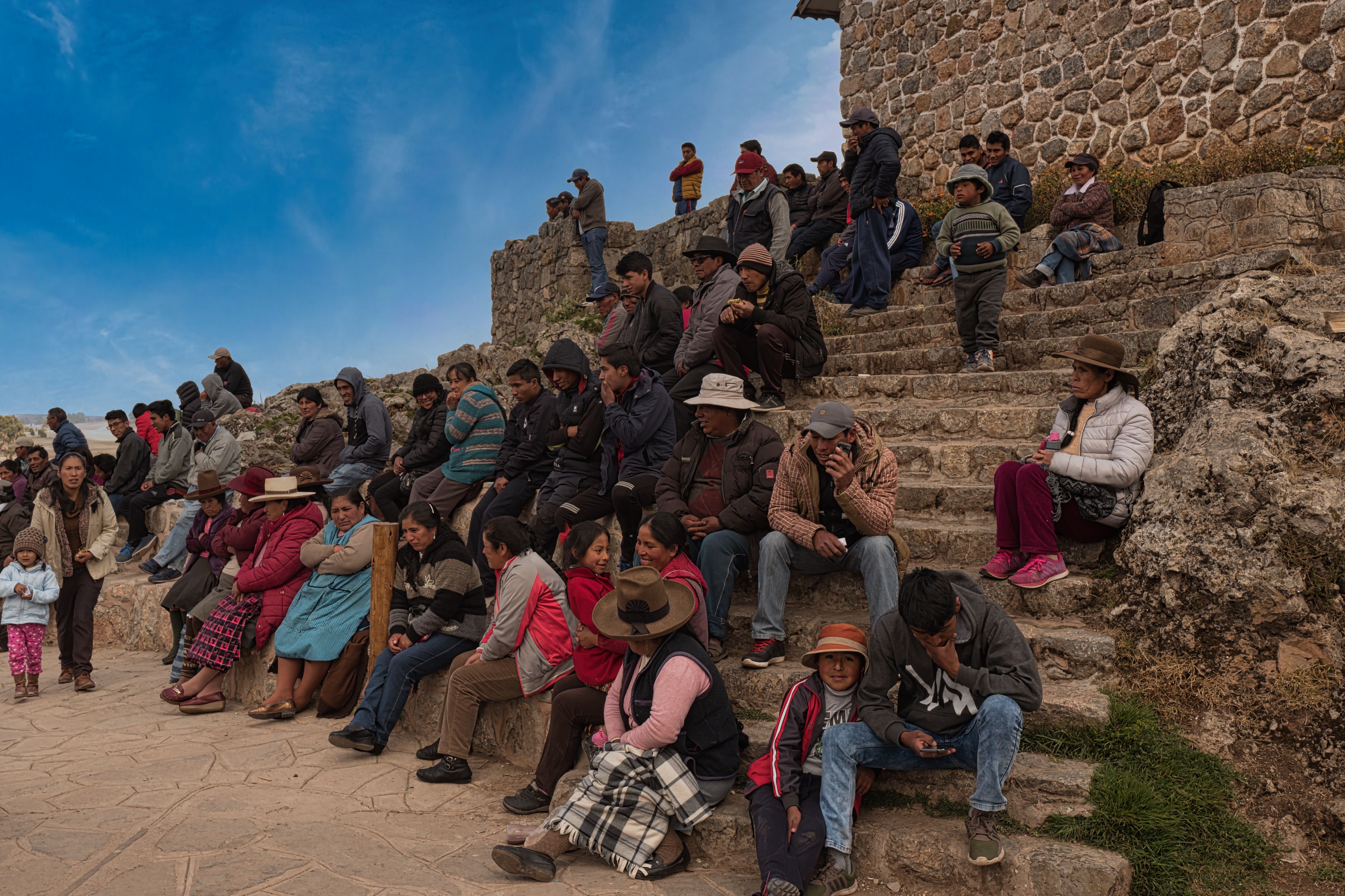 Big Group of People Sitting on Stone Steps · Free Stock Photo