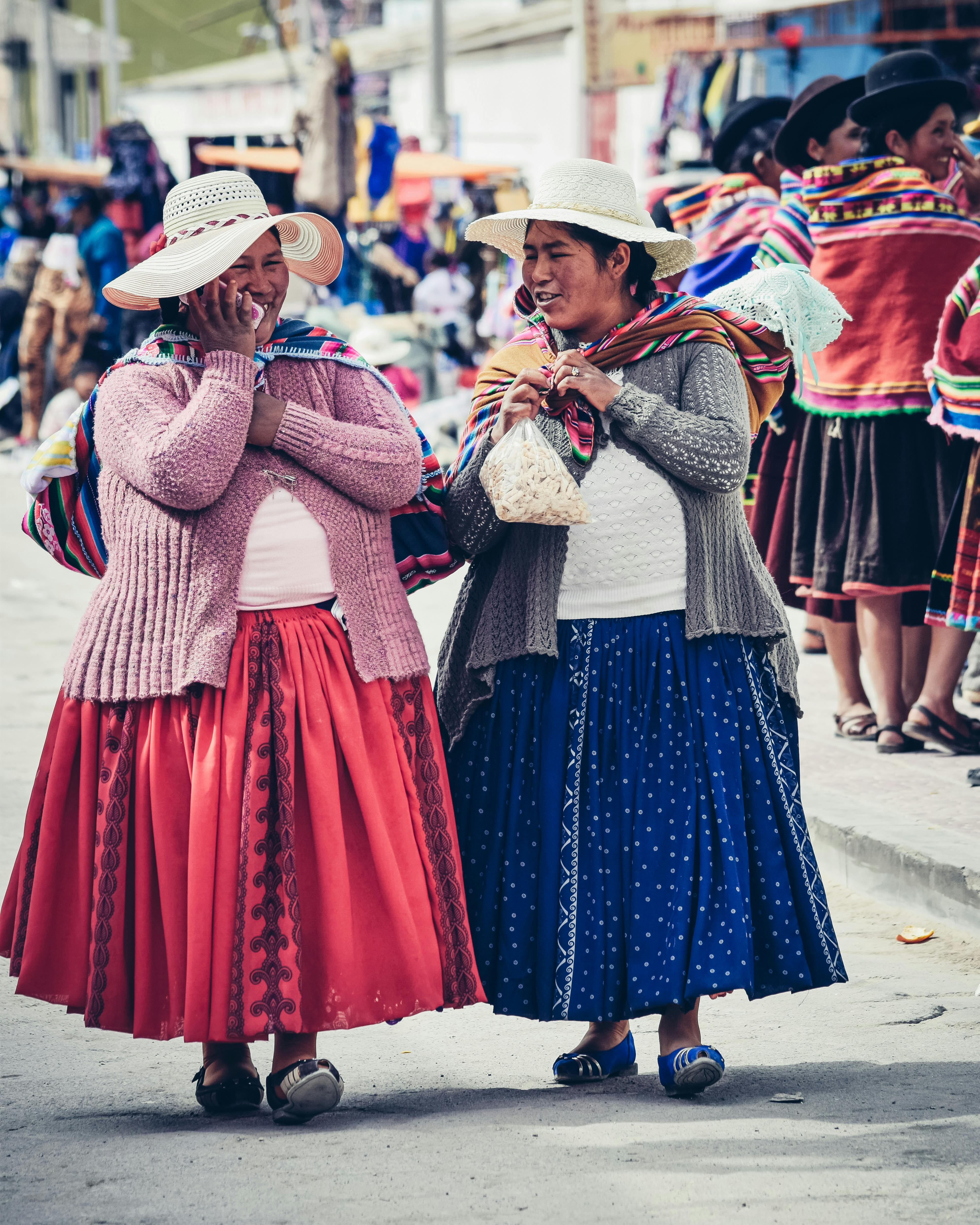 Women in Traditional Clothing on Street · Free Stock Photo