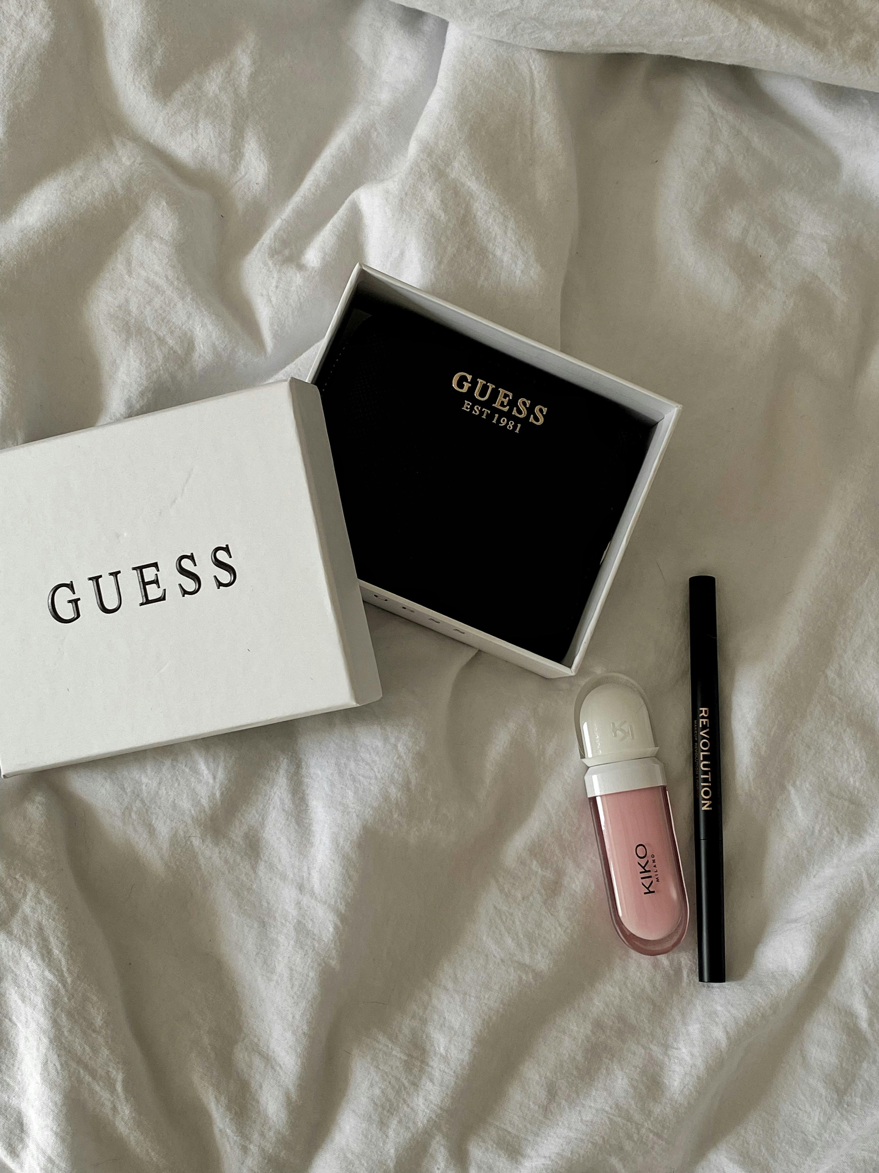 Accessories near Guess Box · Free Stock Photo
