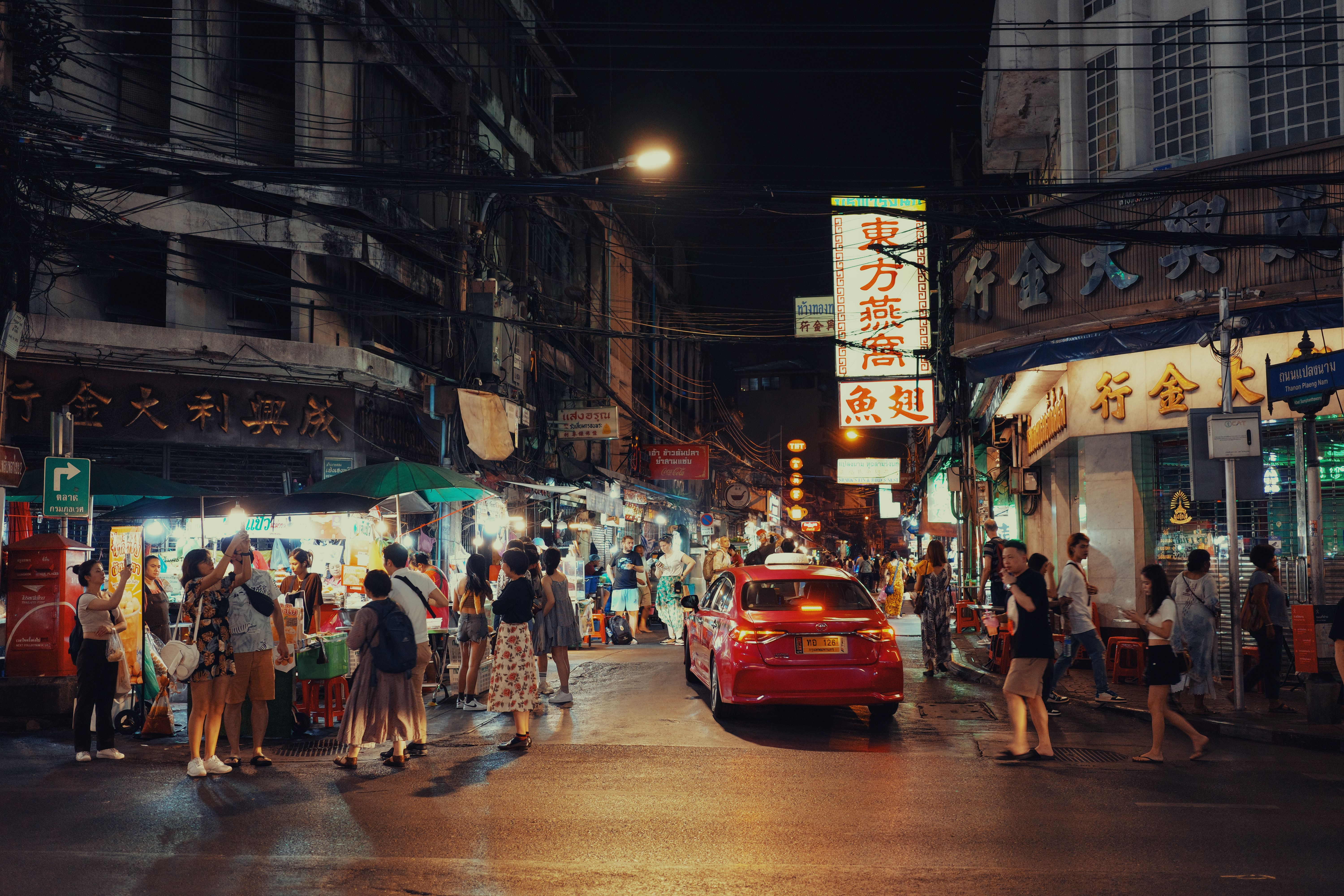 People on Street in Town at Night · Free Stock Photo