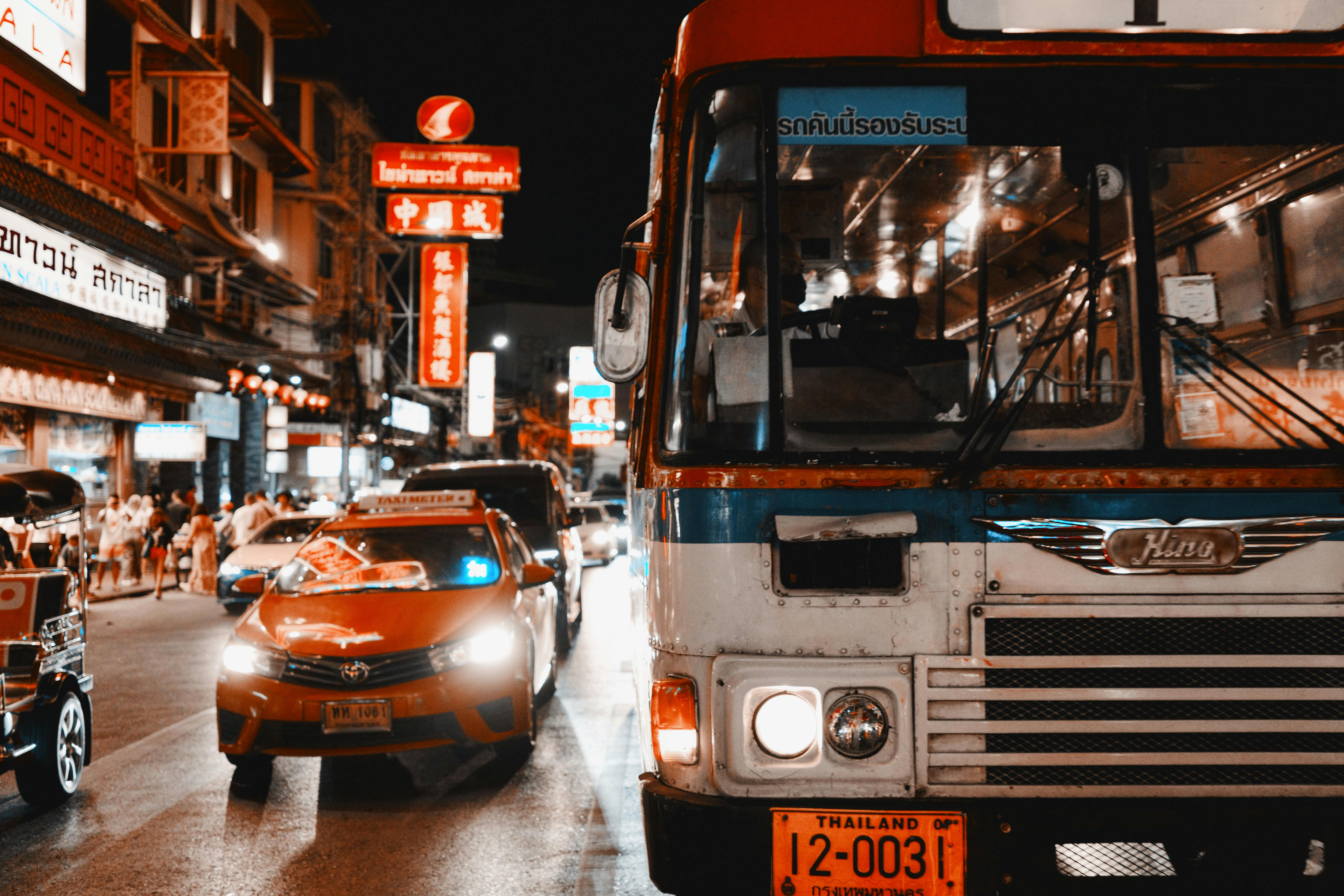 Bus and Cars on Street at Night · Free Stock Photo