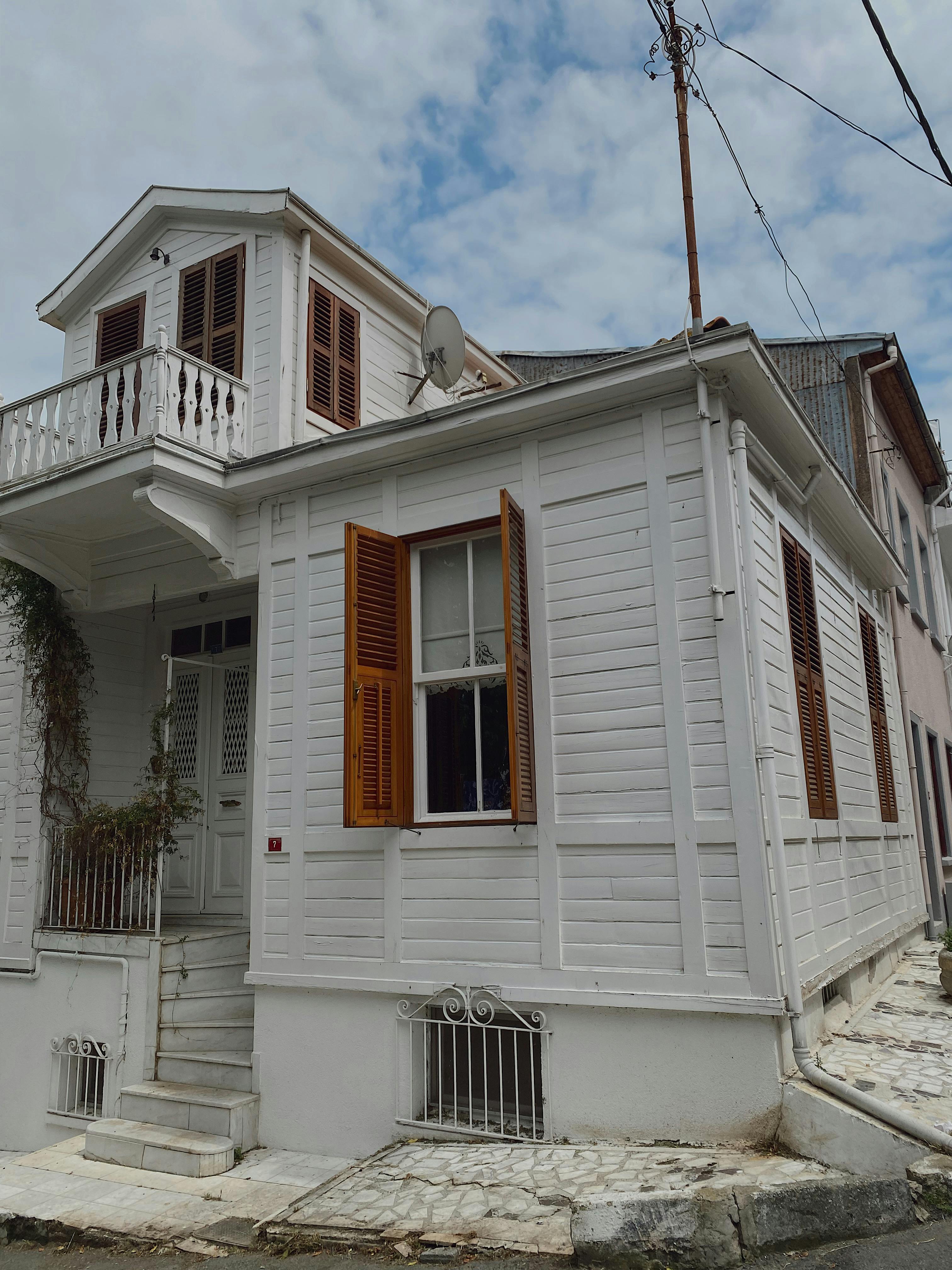 Fenced House Built with Stones · Free Stock Photo