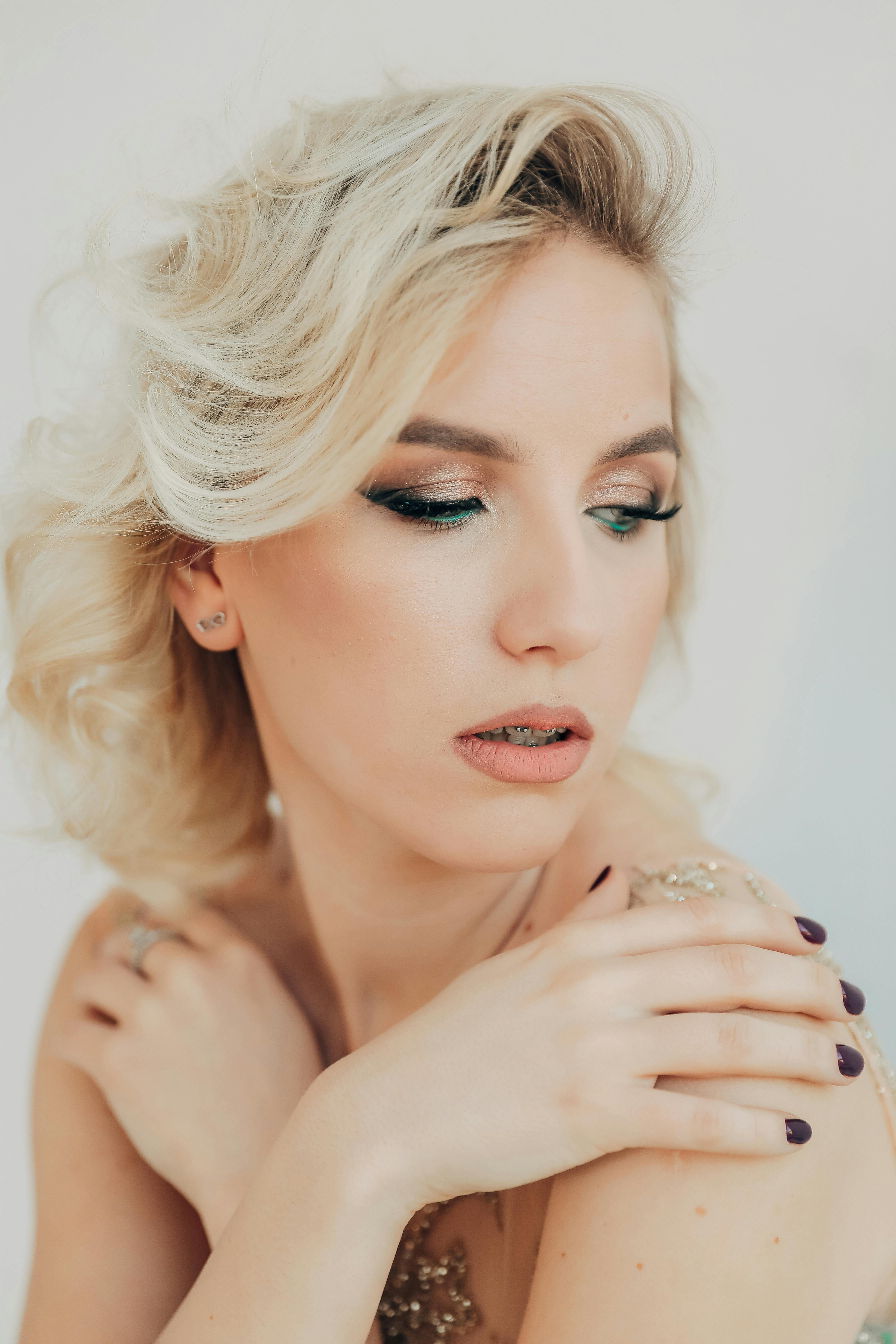 Professional Woman Portrait against Green Background · Free Stock Photo