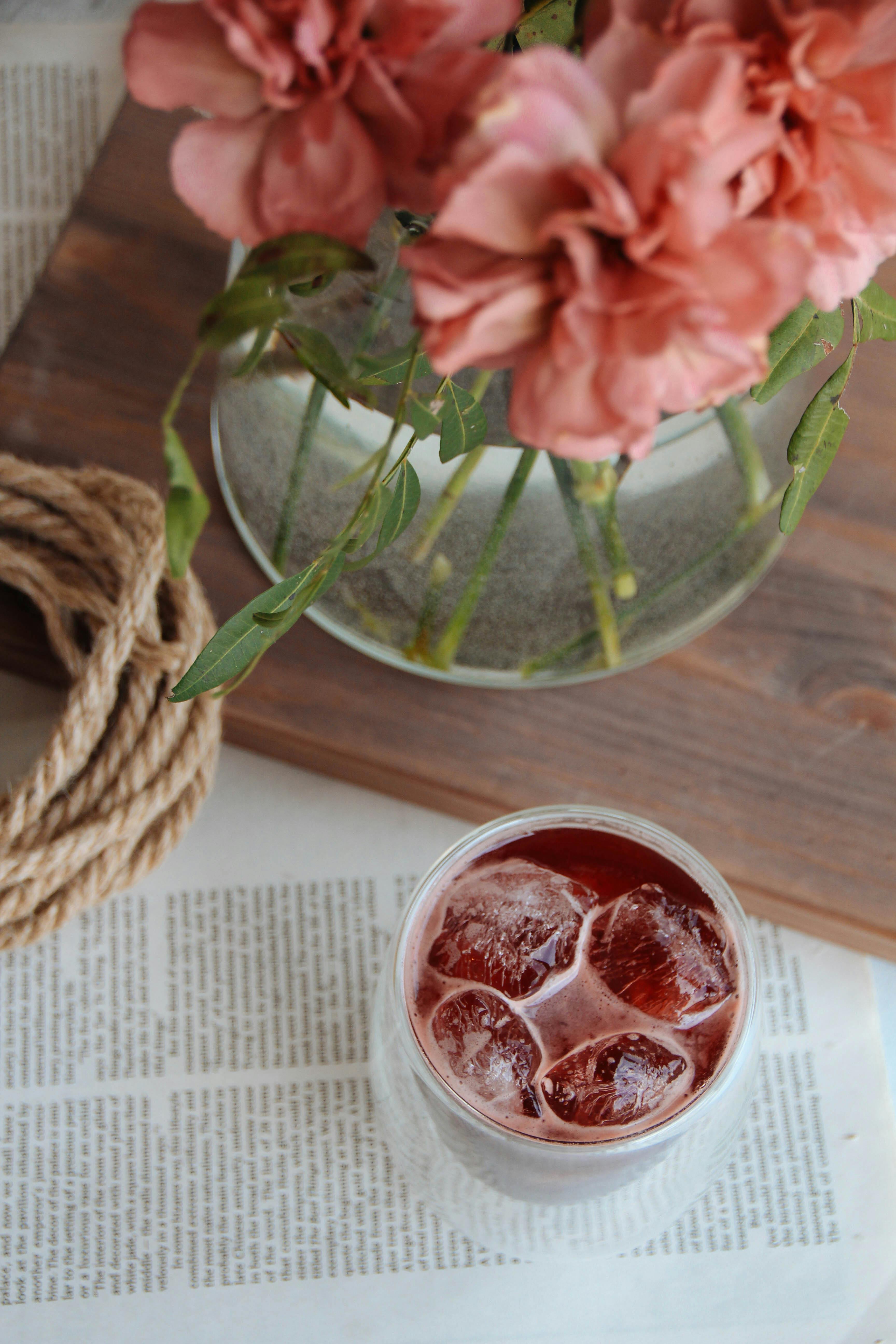 Glass of Beverage with Wedges of Citrus Fruits · Free Stock Photo