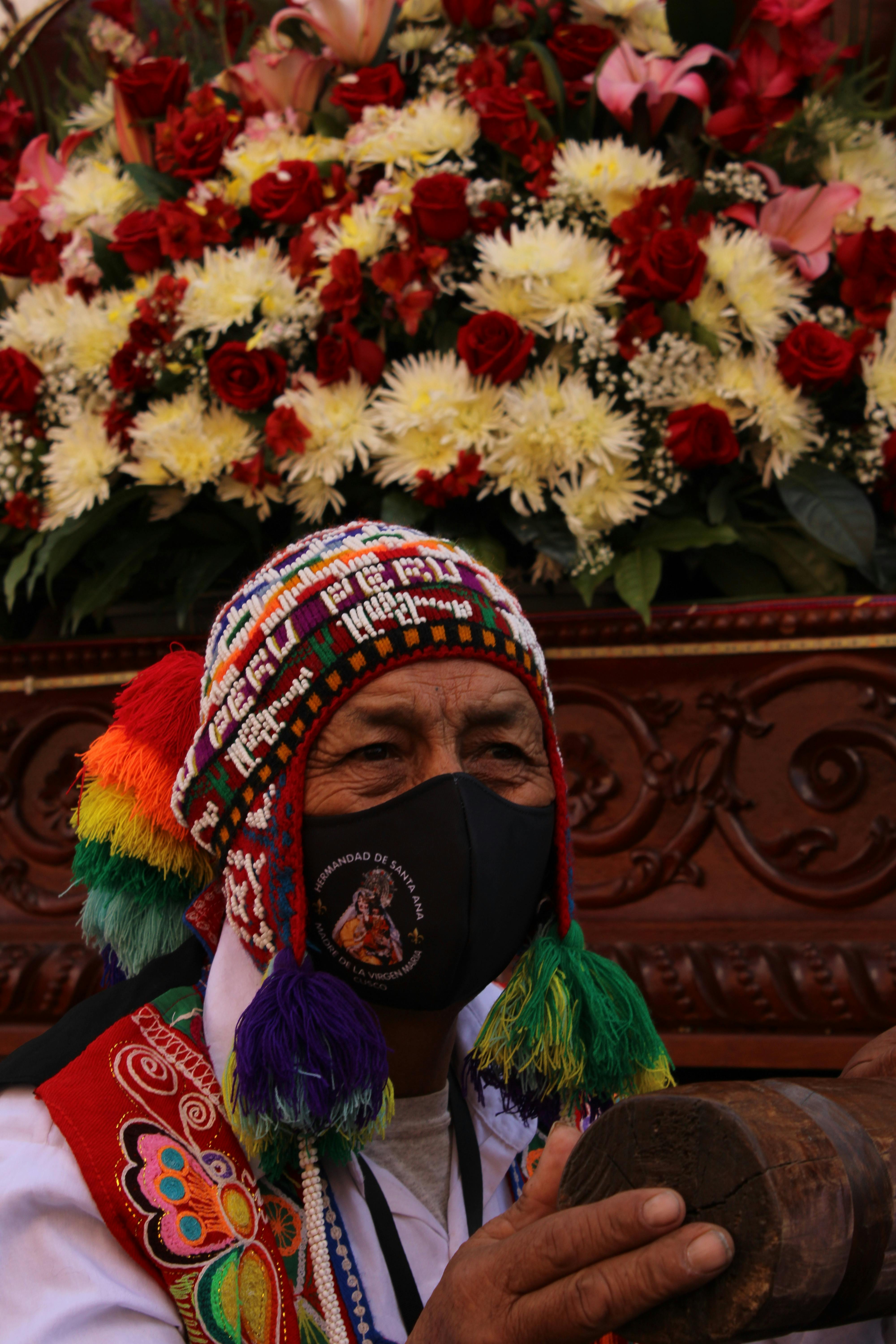 Closeup of a Floral Garland and a Man Wearing Traditional Clothing ...