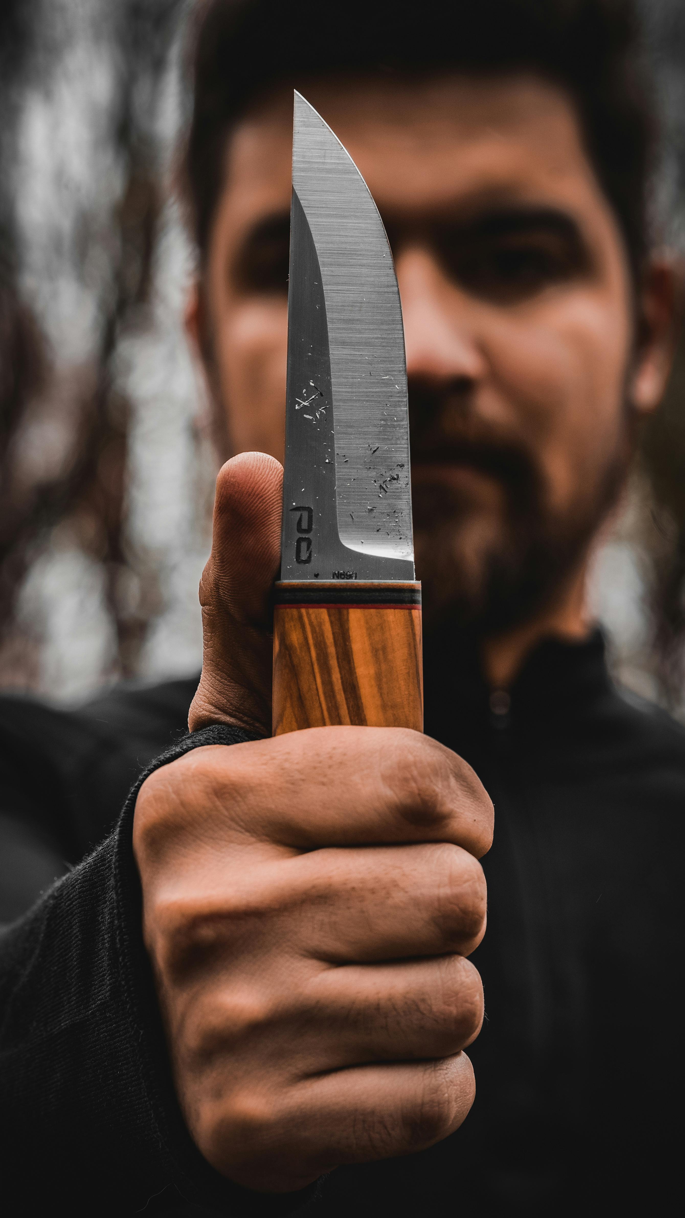 Man Hand Holding Sharp Knife · Free Stock Photo
