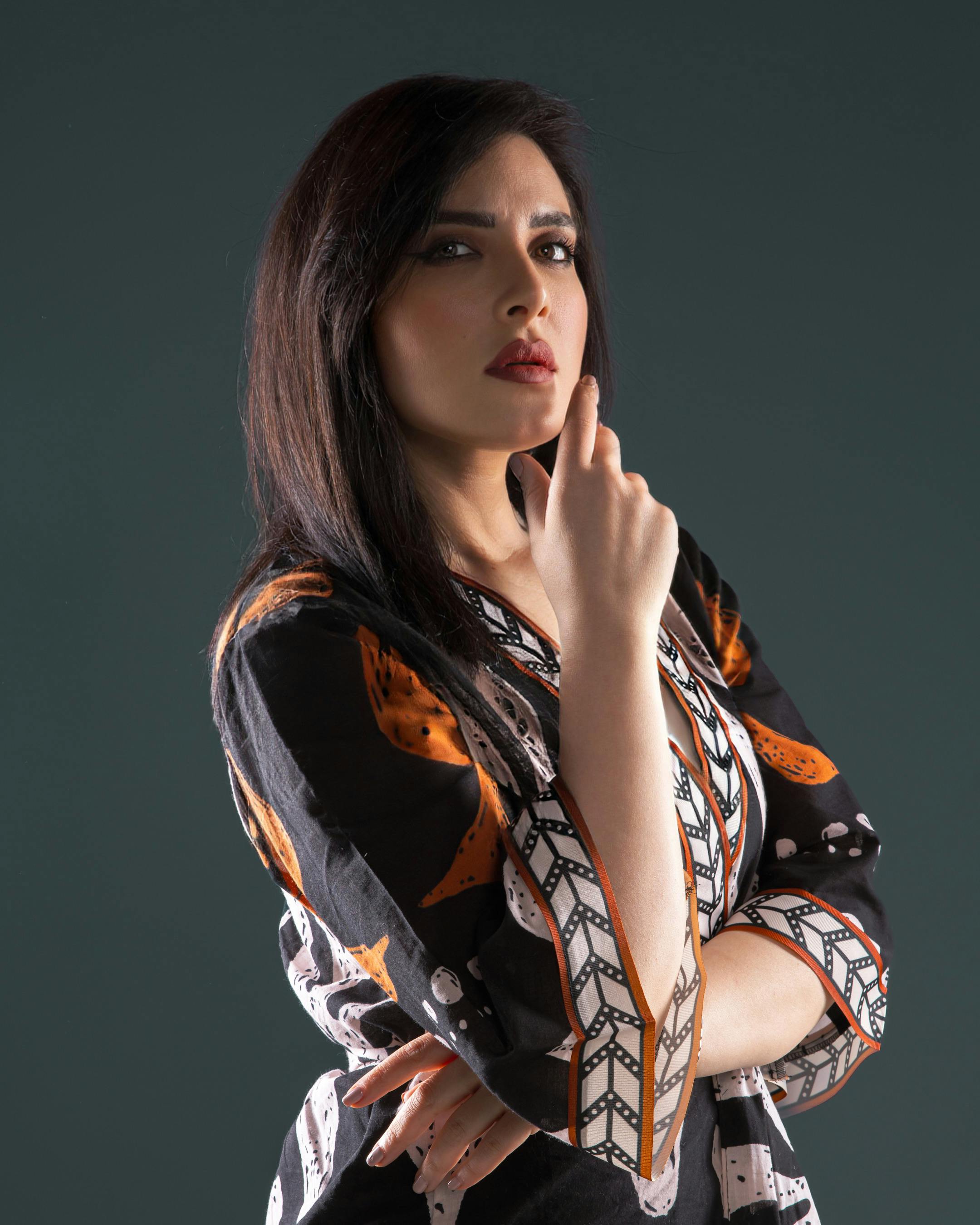 Portrait of Woman in Loose Robe Thinking · Free Stock Photo