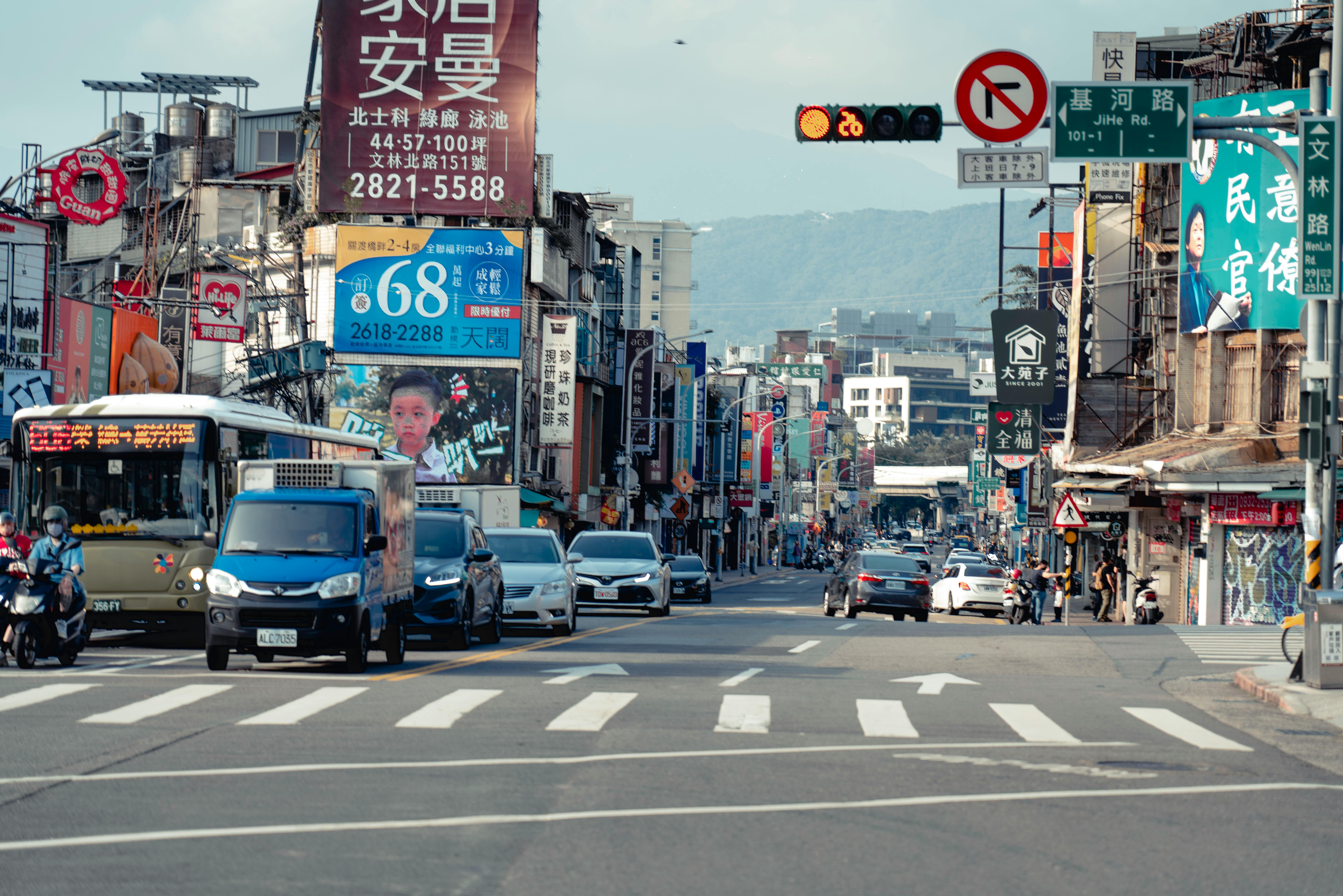 Street Intersection with Zebra Crossing in Asian City · Free Stock Photo