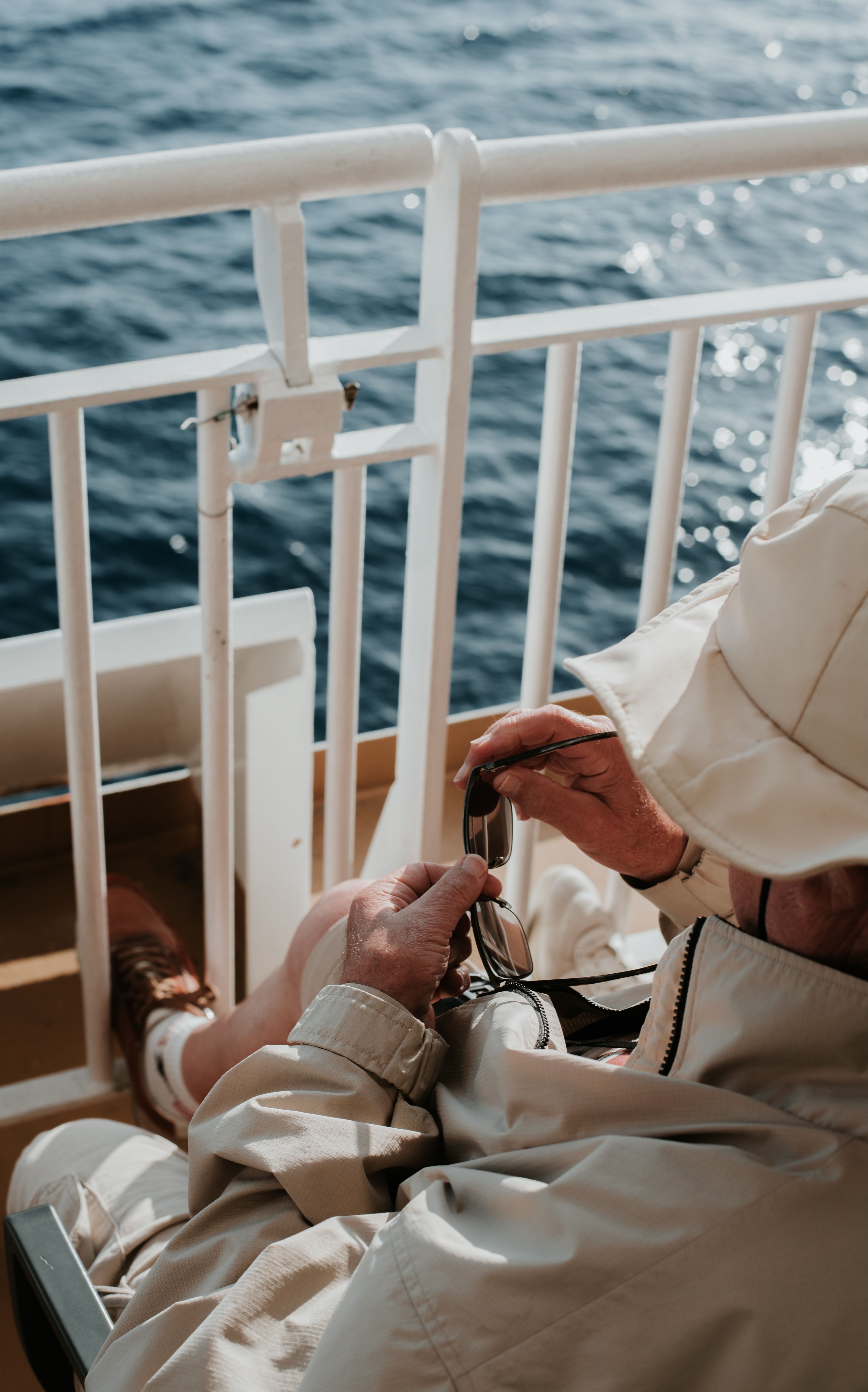 Two Young Men Posing on a Ship Deck · Free Stock Photo