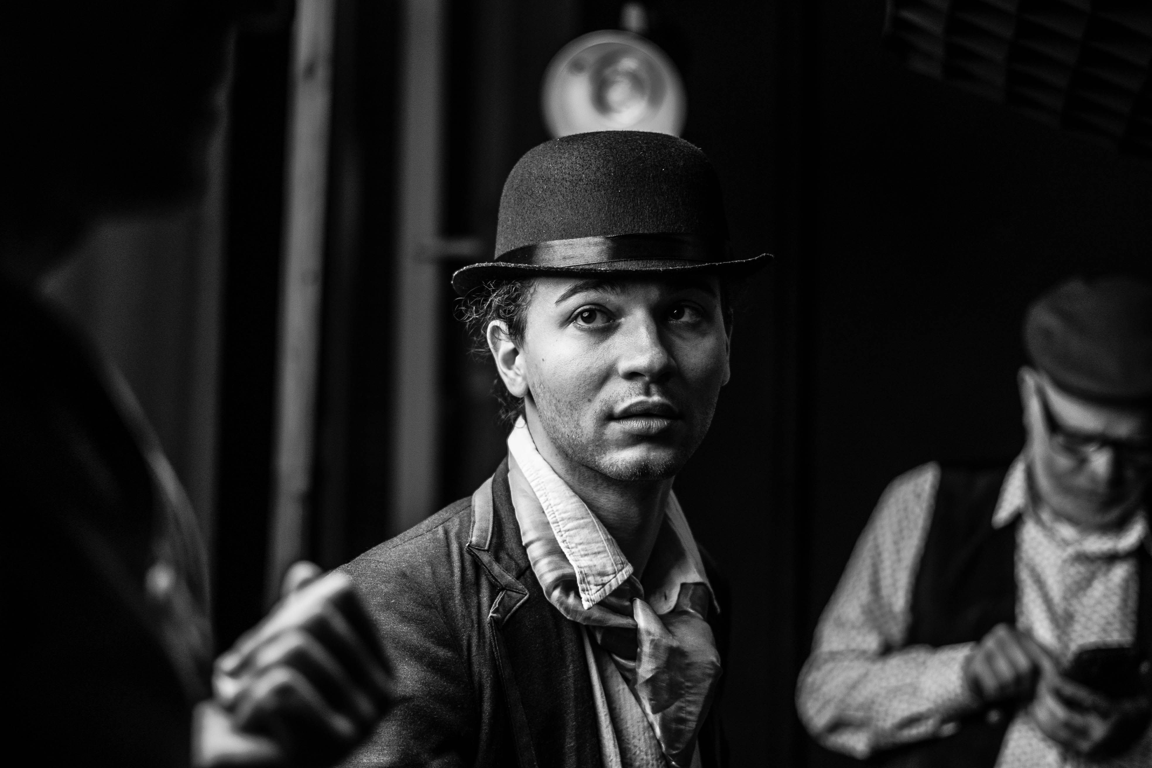 Elegant Musician in Fedora · Free Stock Photo