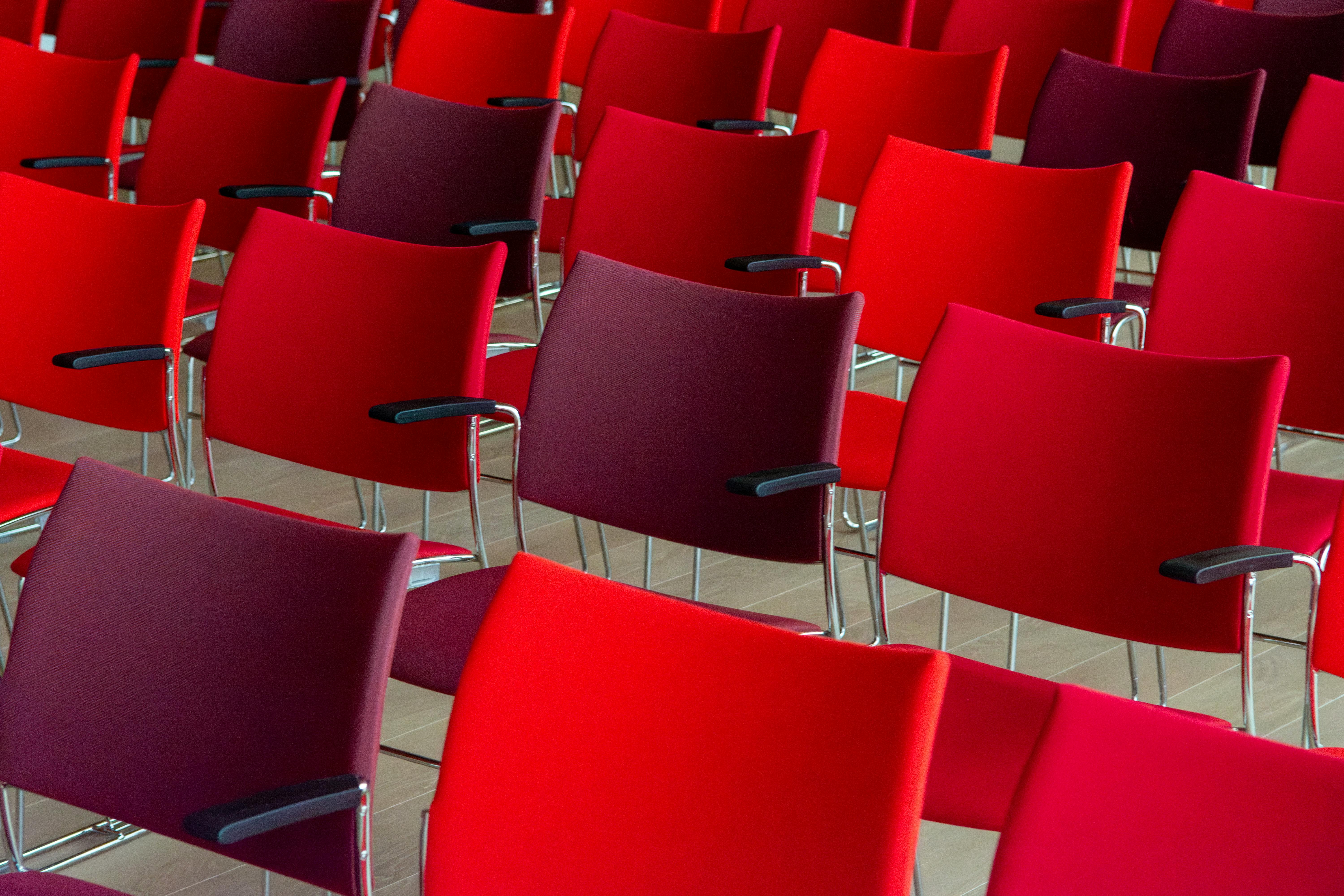 Colorful Seats in an Auditorium · Free Stock Photo