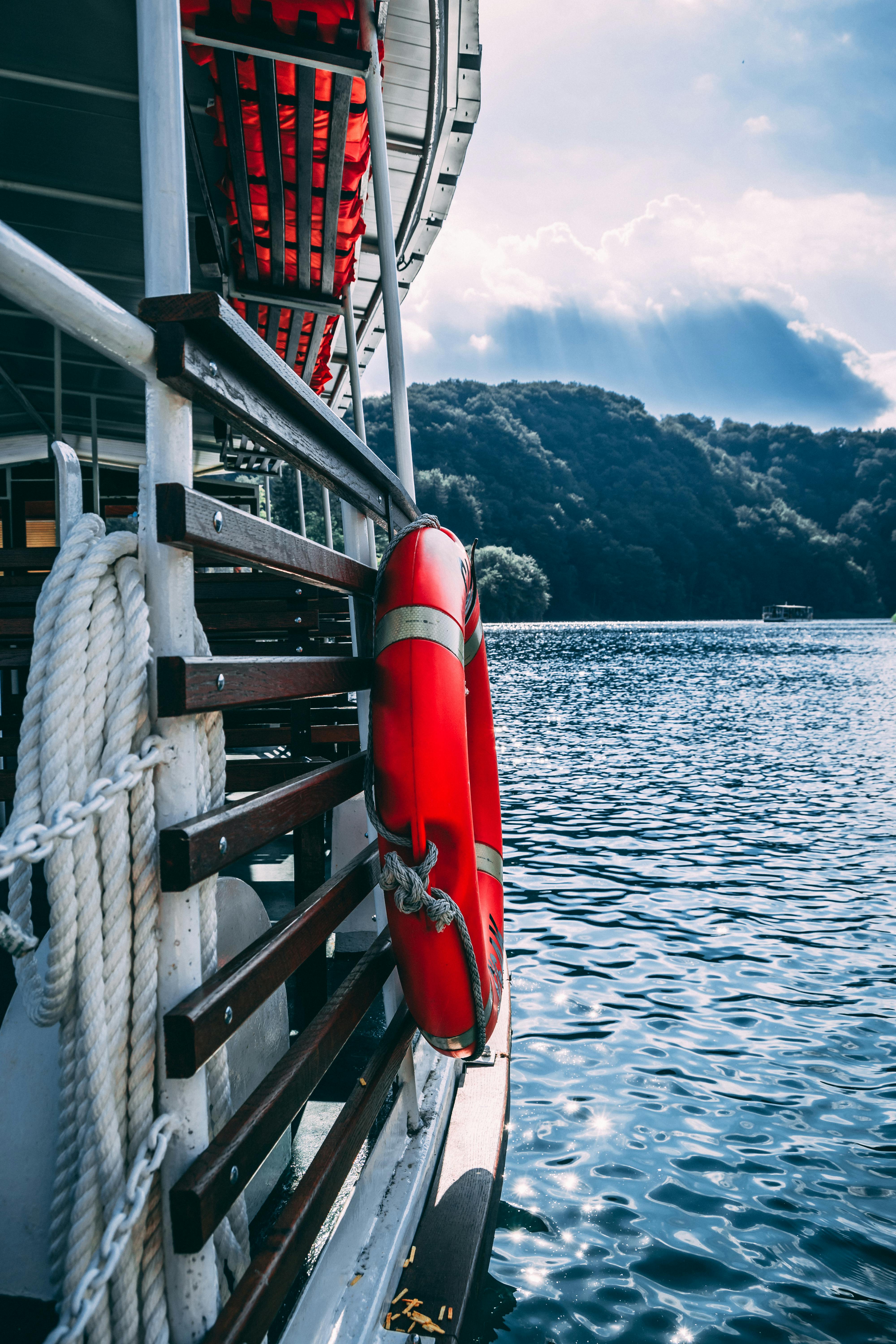 Red and White Inflatable Lifebuoy · Free Stock Photo