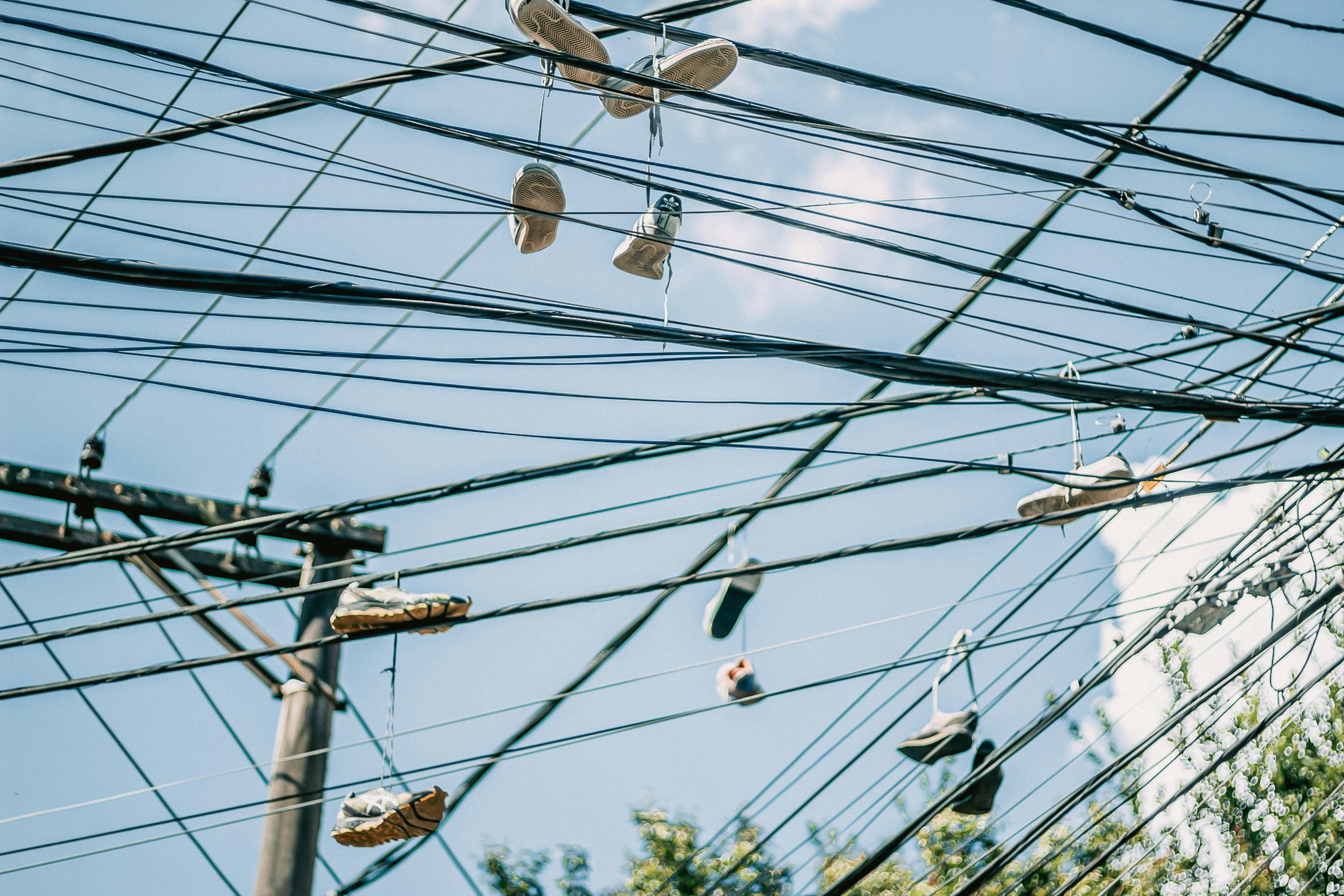 Shoes on Wires · Free Stock Photo