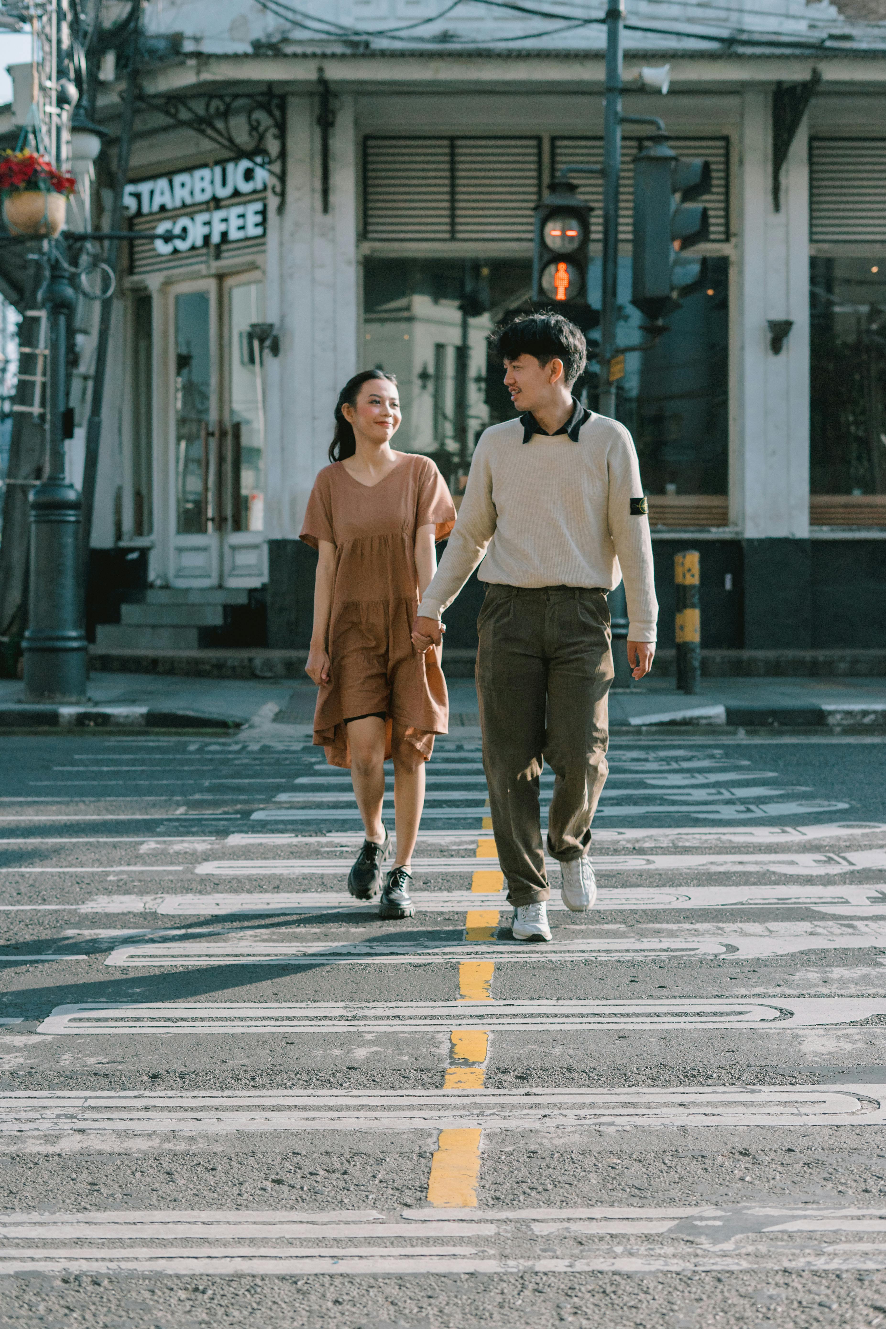 Couple Crossing a Street · Free Stock Photo