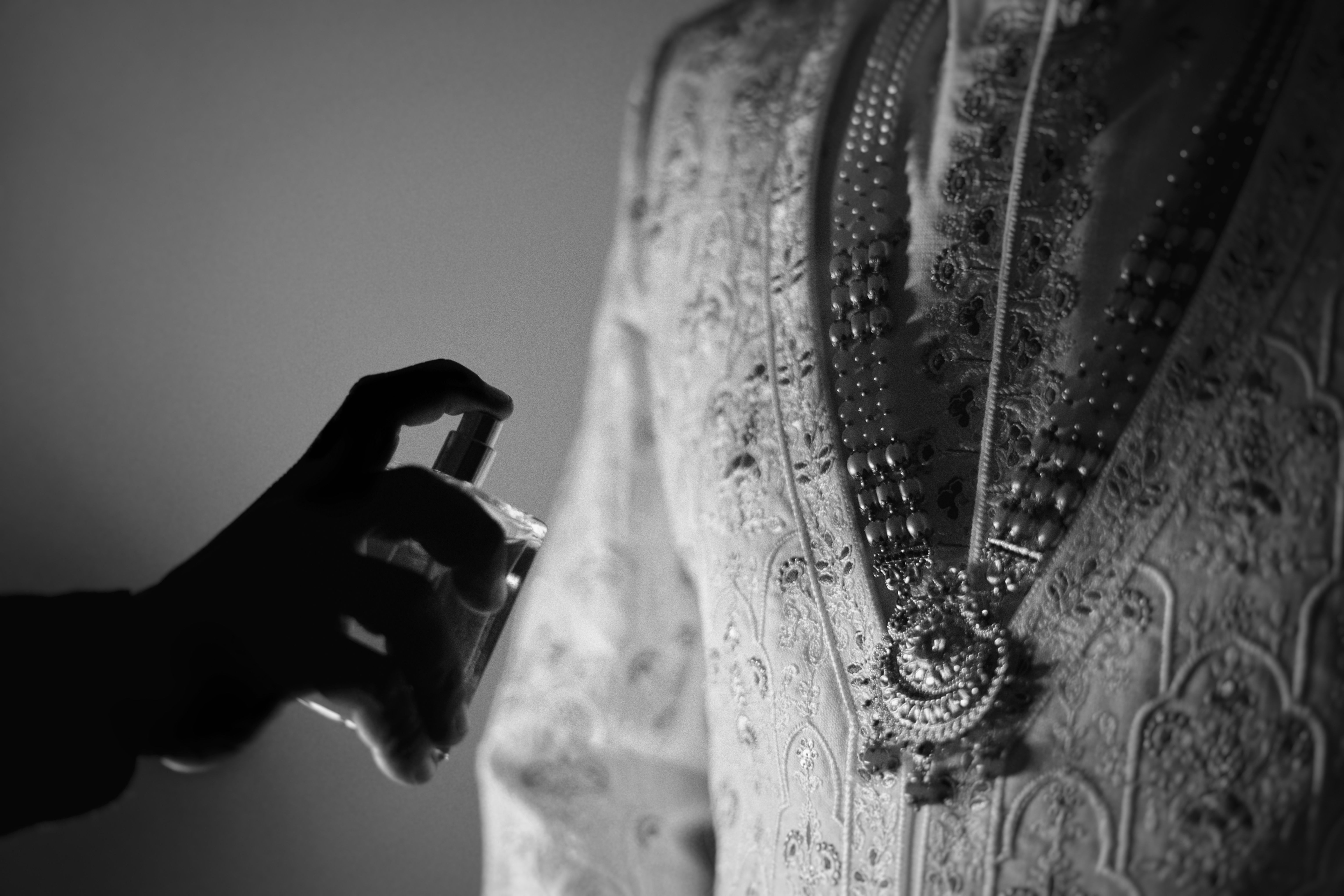 Perfume Spraying on Luxury Ornate Clothes · Free Stock Photo