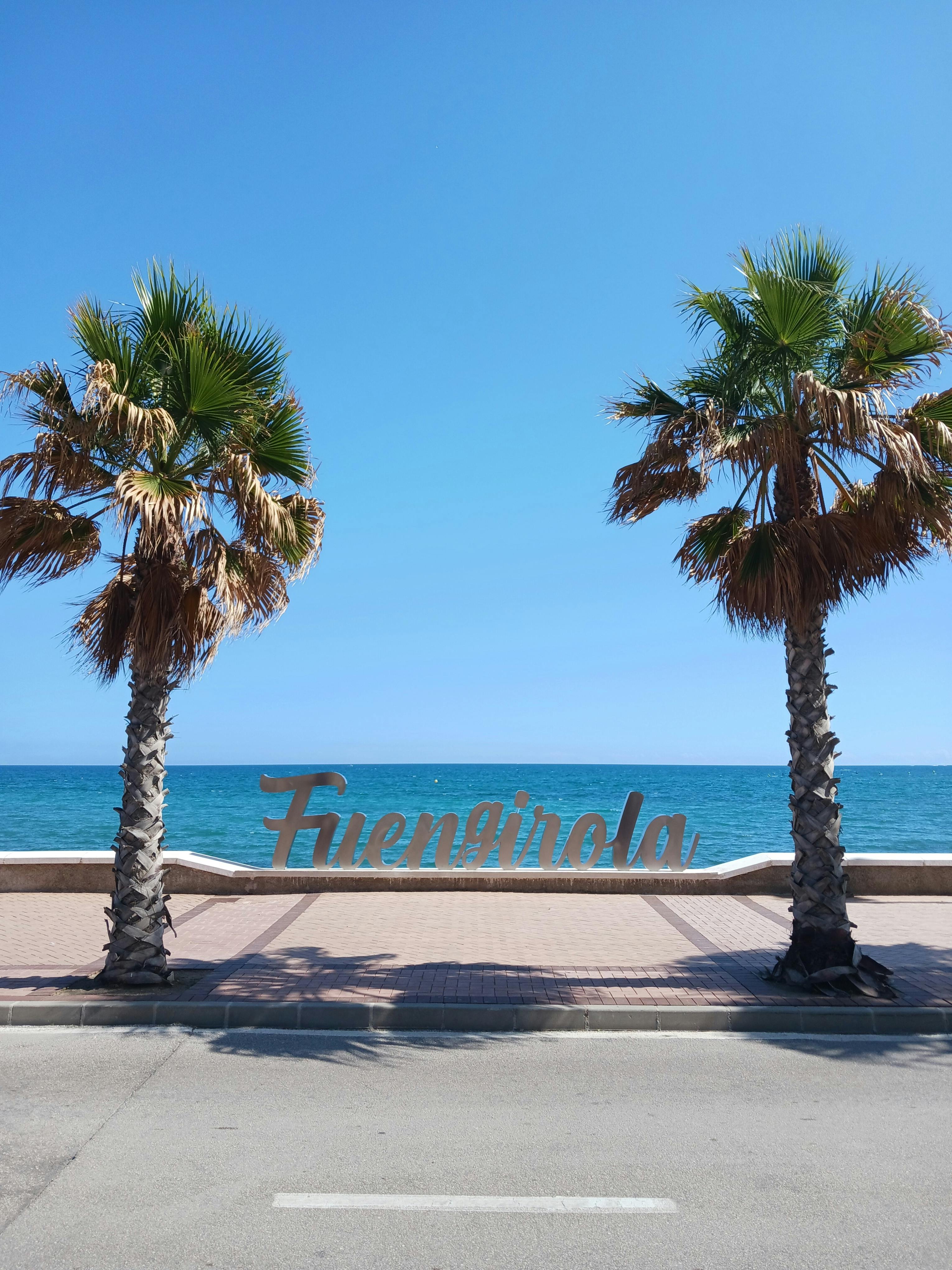 Fuengirola Sign between Two Palm Trees, Malaga, Spain · Free Stock Photo