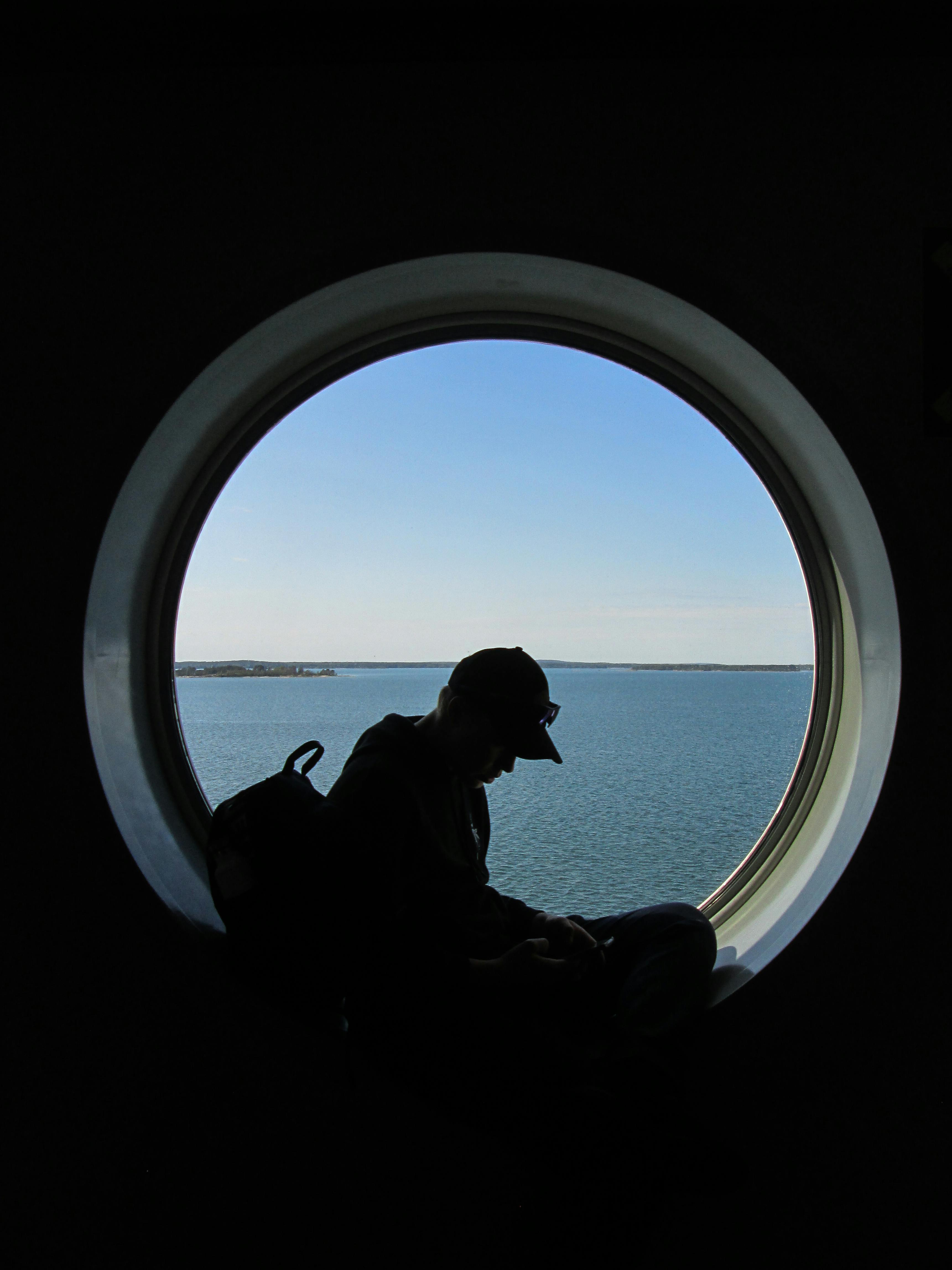 Silhouette of a Man by the Window · Free Stock Photo