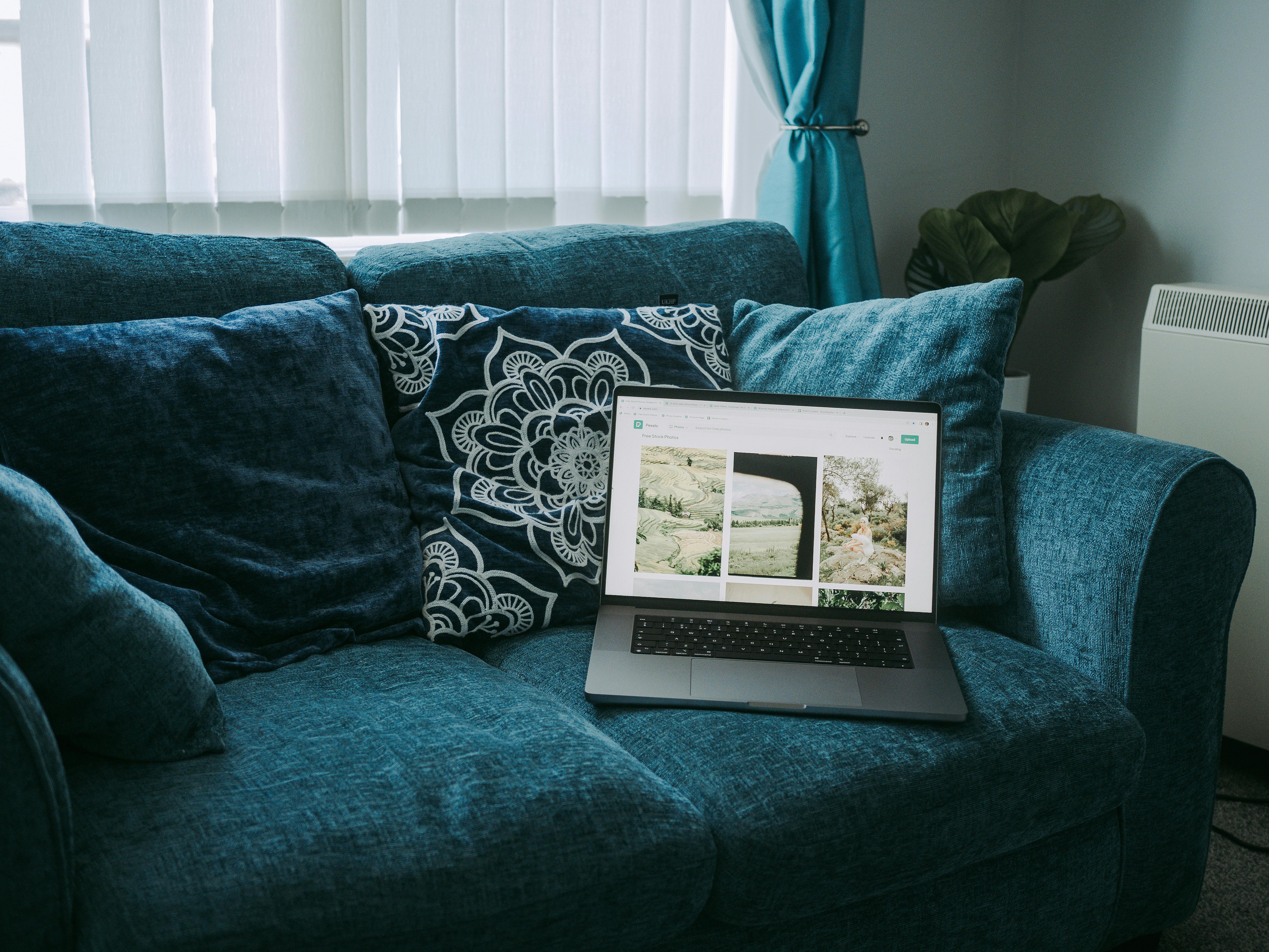 Laptop on Couch · Free Stock Photo