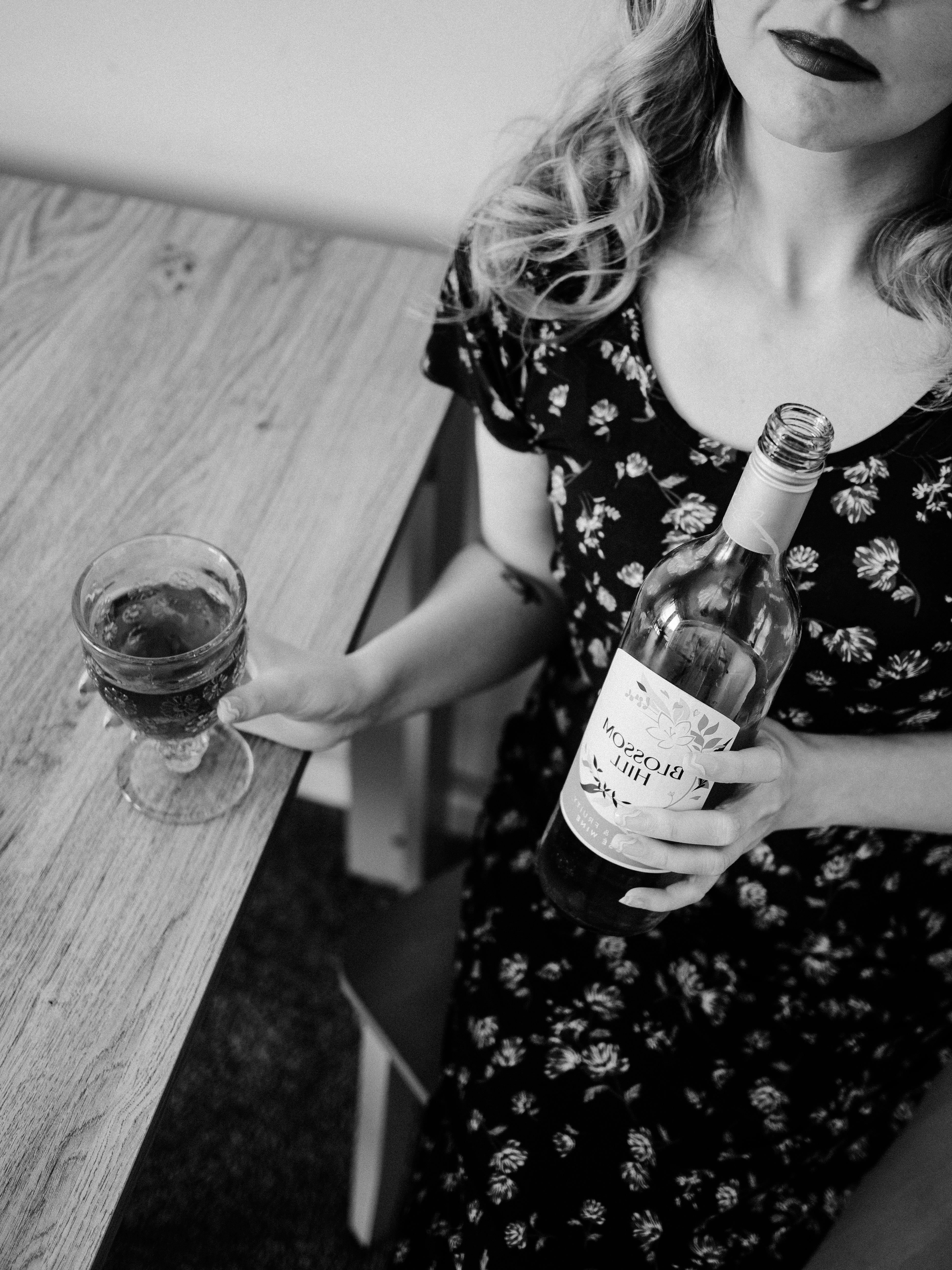 Woman with Wine Bottle and Glass · Free Stock Photo