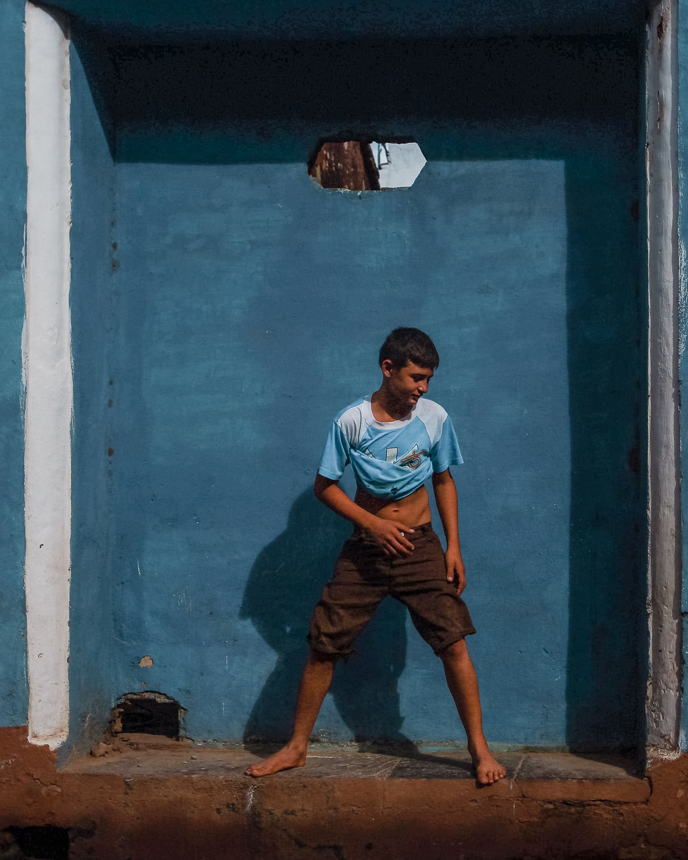 A Young Boy on a Street · Free Stock Photo
