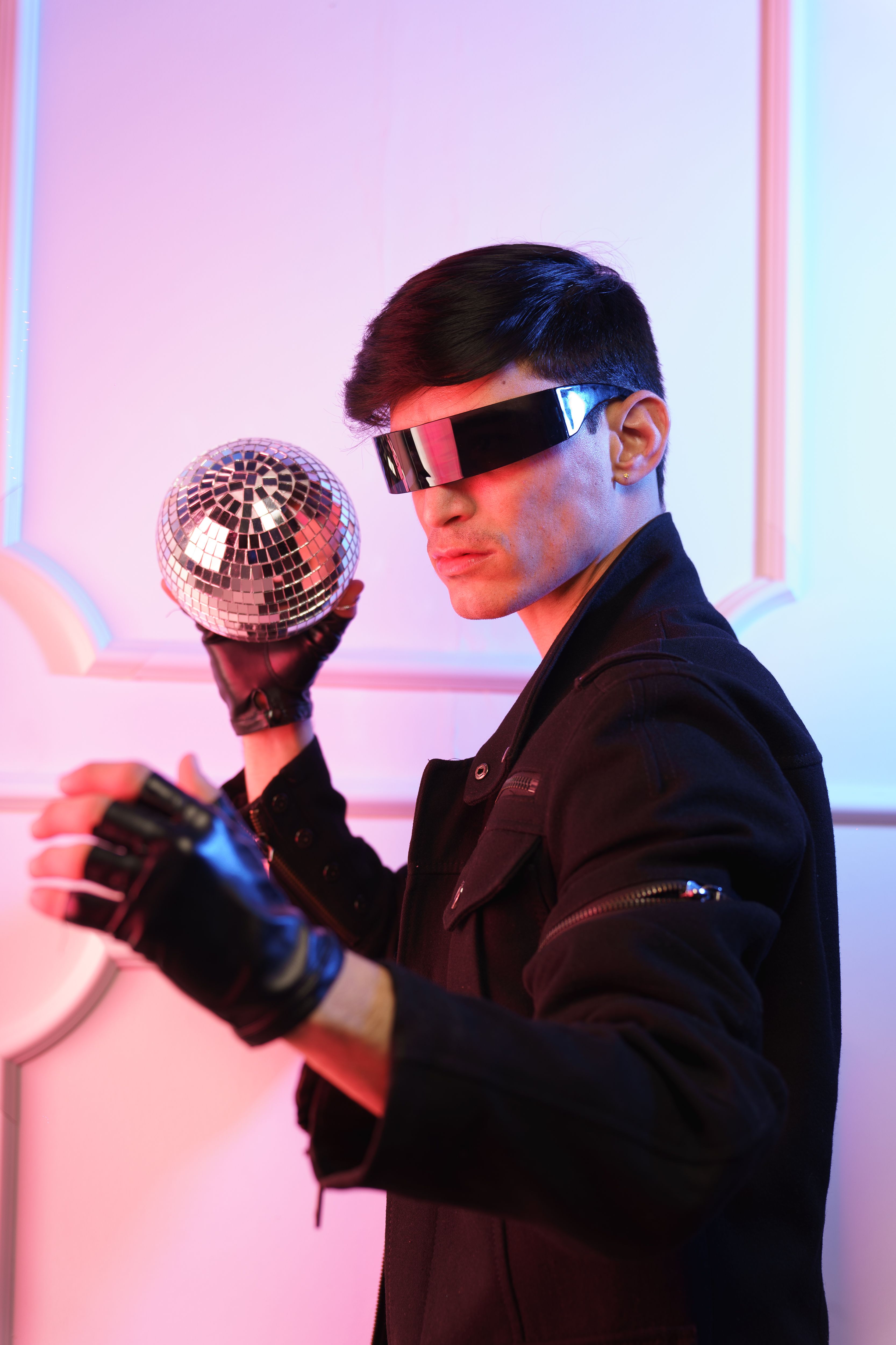 A Young Man with a Disco Ball · Free Stock Photo