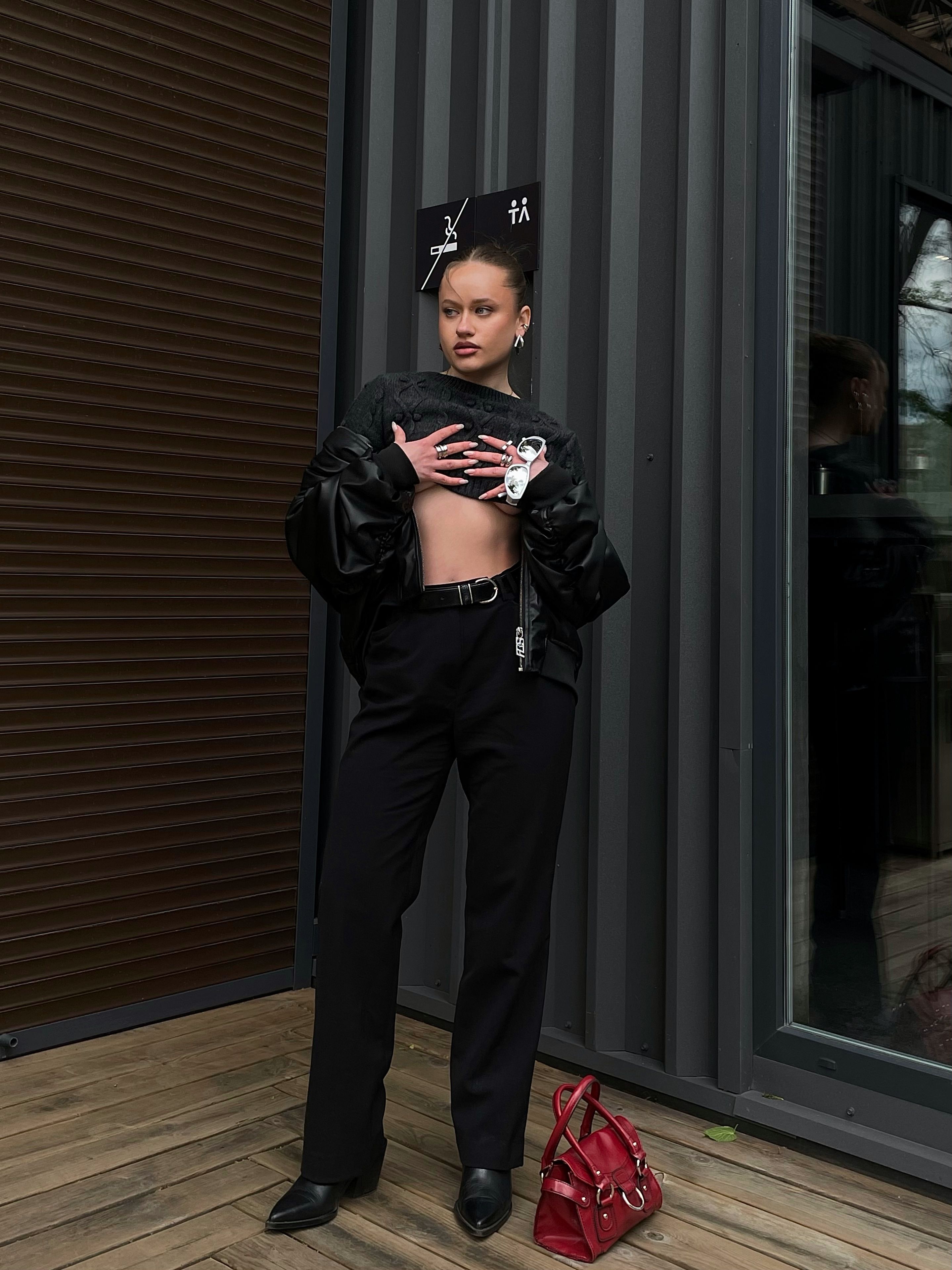 Model Posing in Black Pants · Free Stock Photo