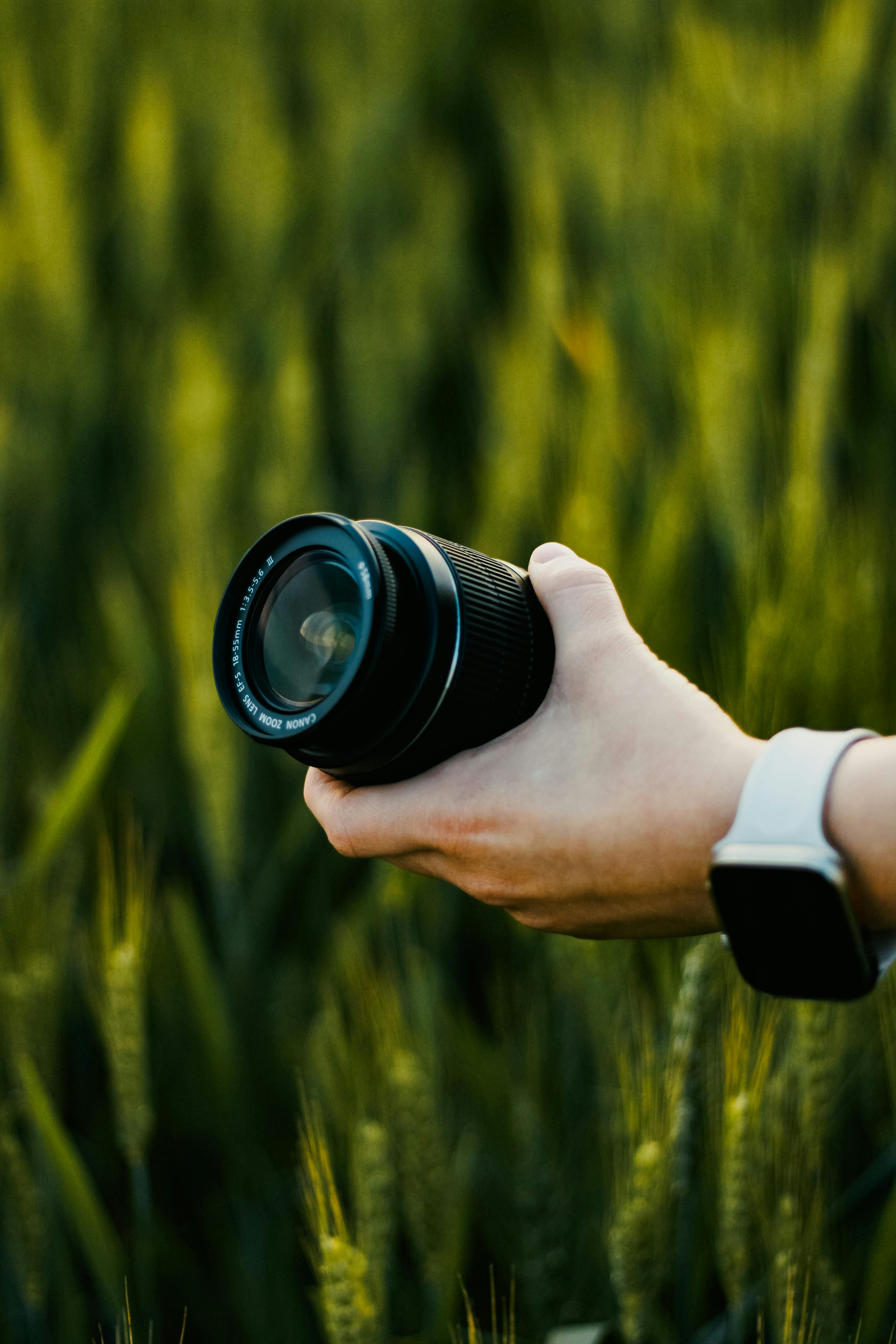 Man Stretching Hand through Fisheye Lens · Free Stock Photo
