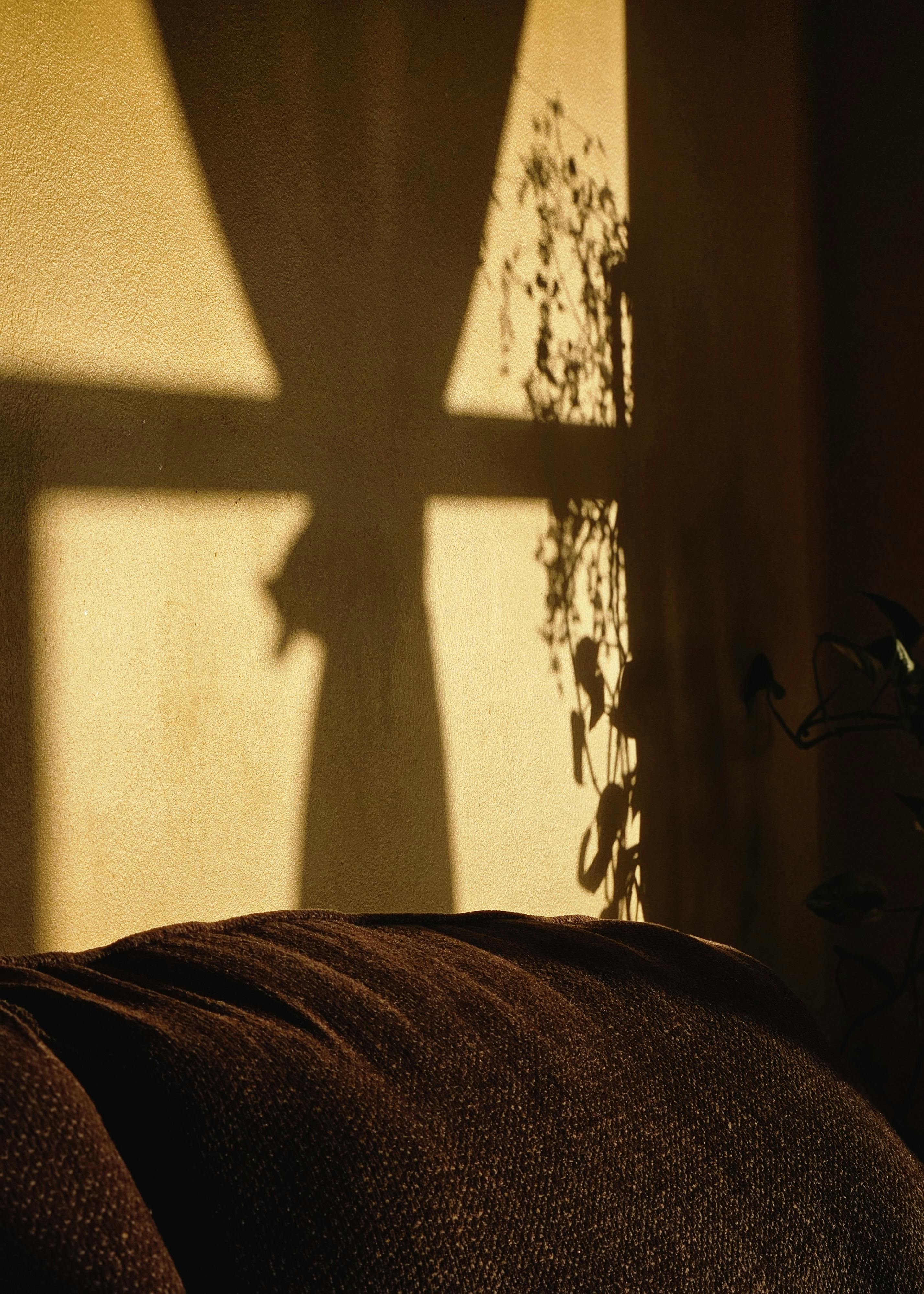 Curtain Shadow on Sunlit Wall · Free Stock Photo