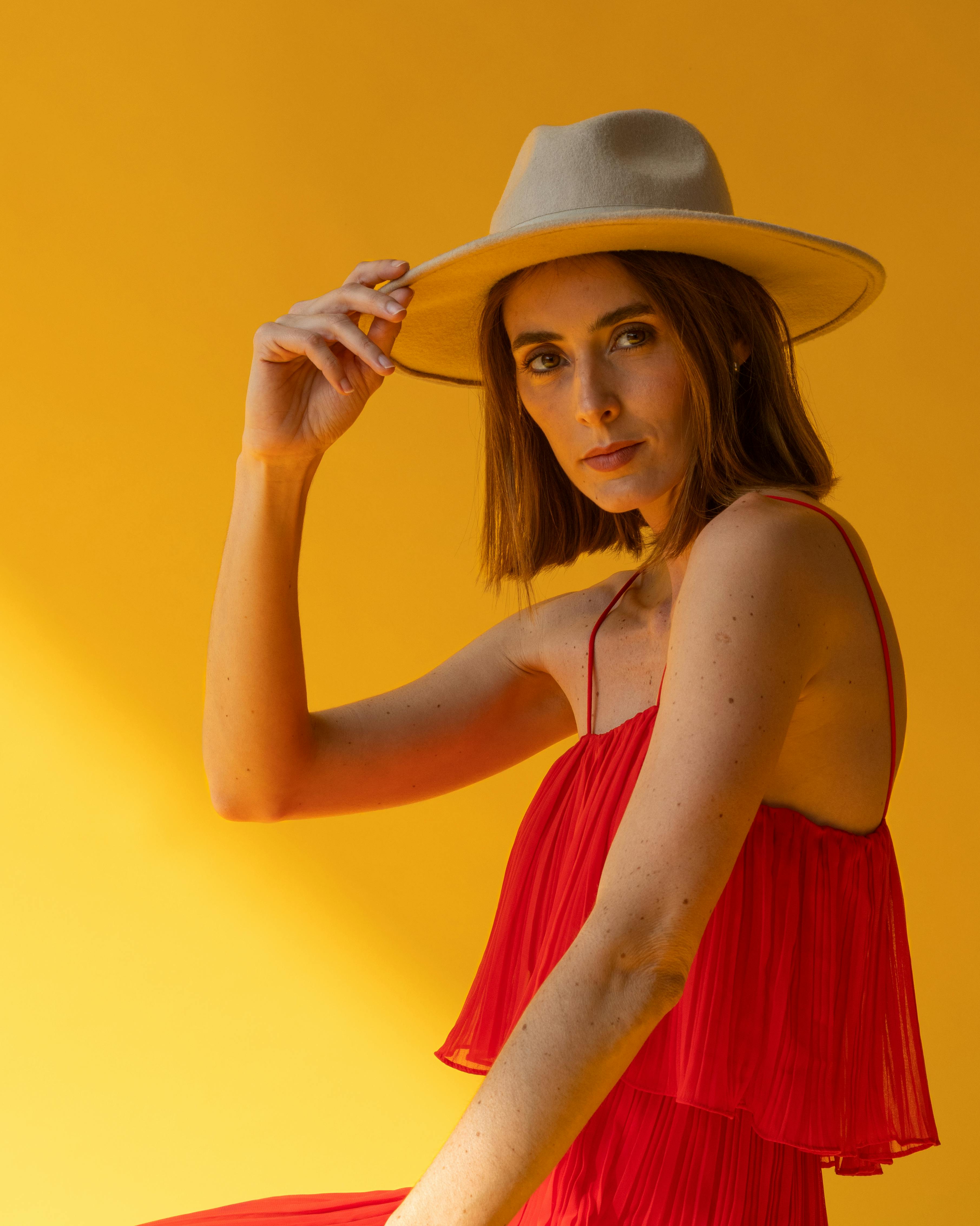 Woman Posing in Hat and Red Clothes · Free Stock Photo