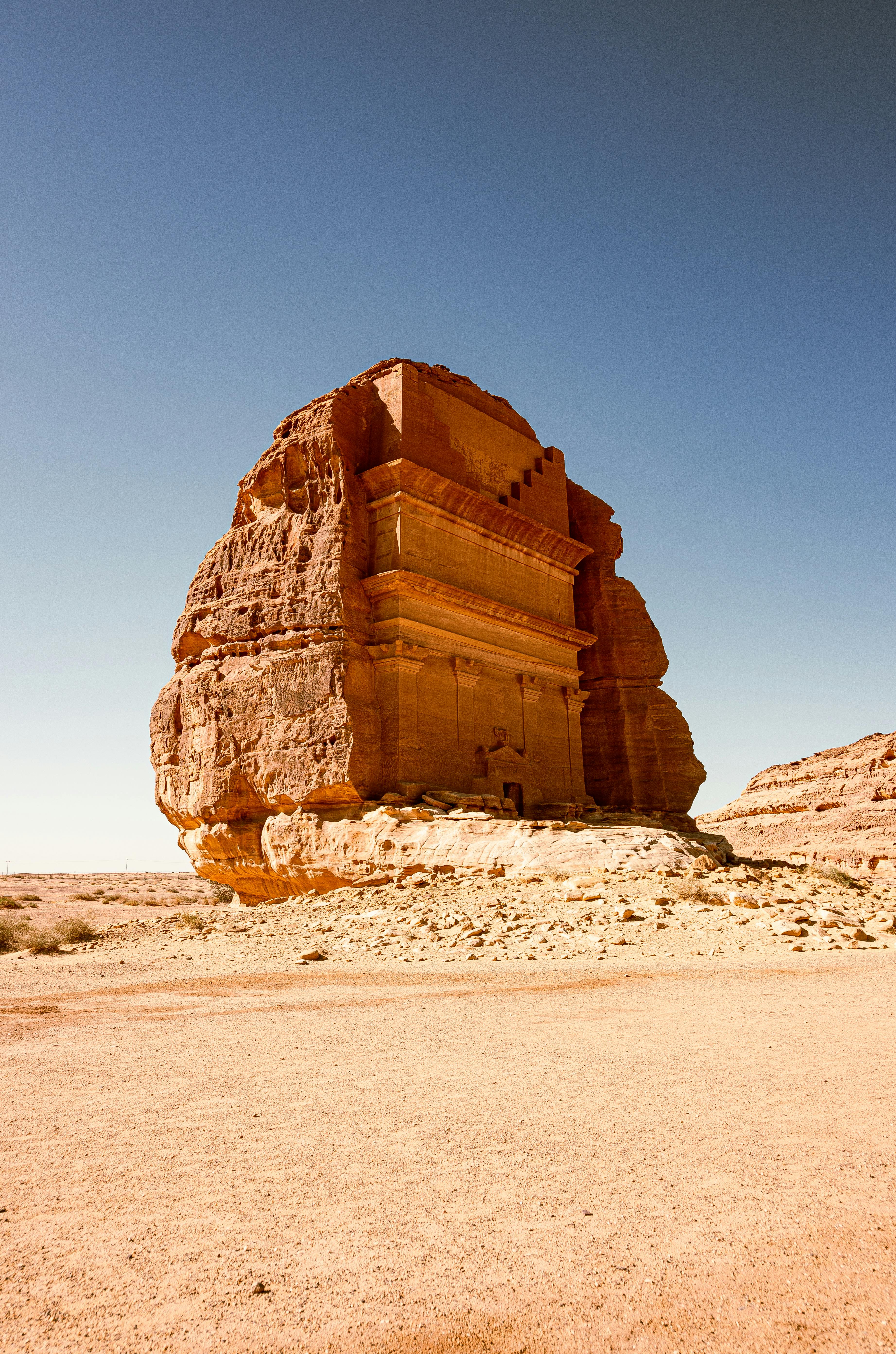 Ancient Building Carved in Rock Formation · Free Stock Photo