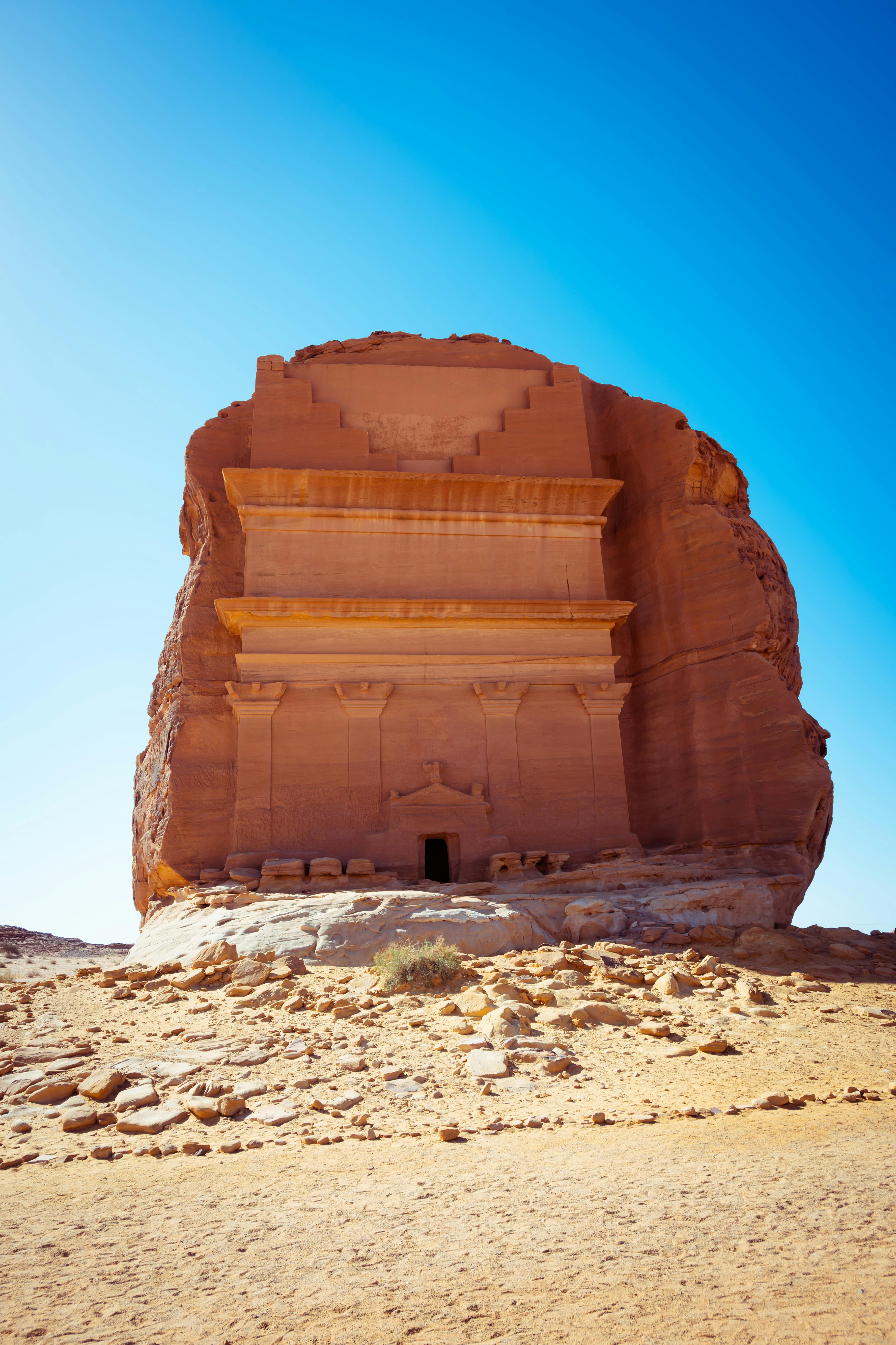 Building Carved in Rock Formation on Desert · Free Stock Photo