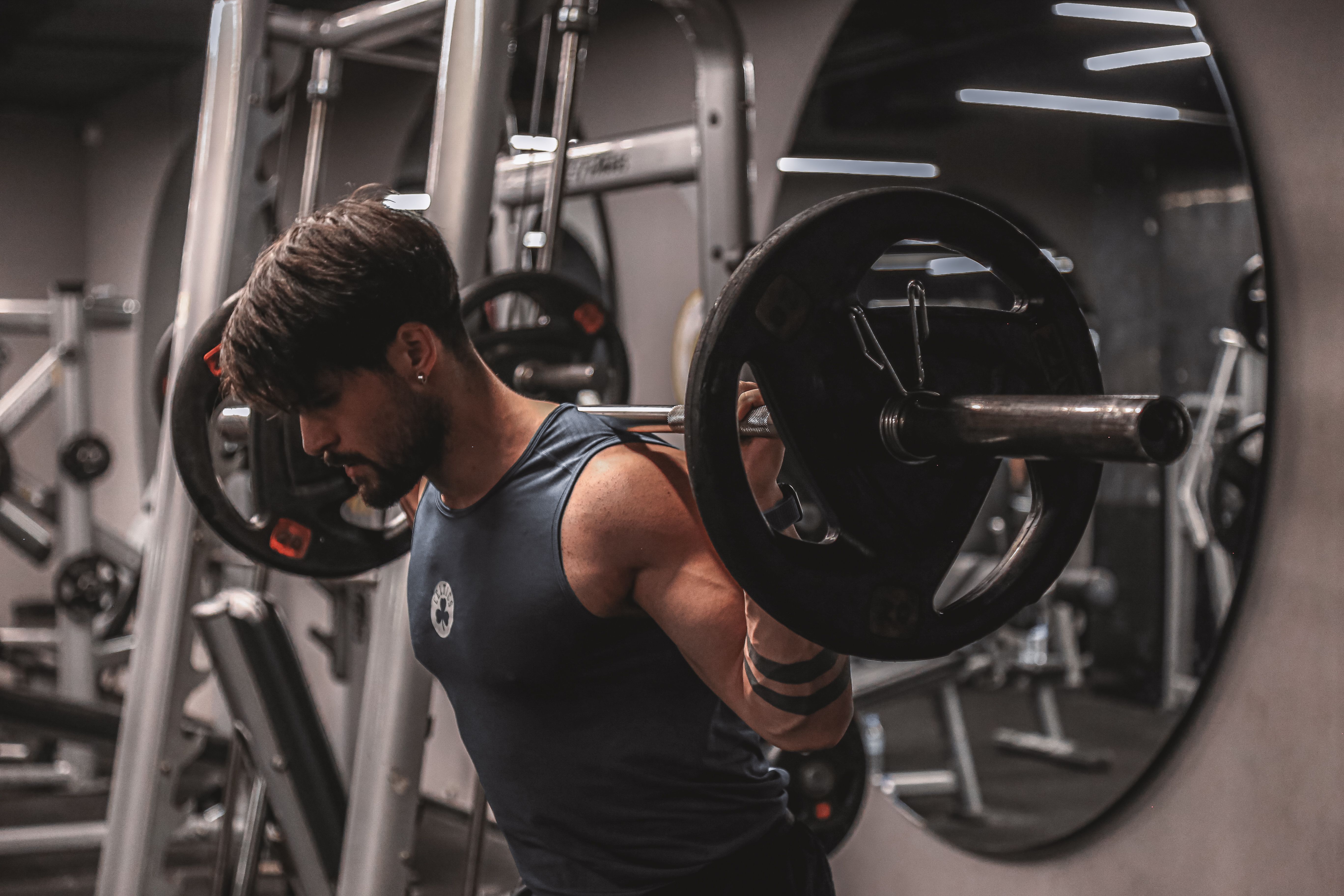 Man Exercising with Bar at Gym · Free Stock Photo