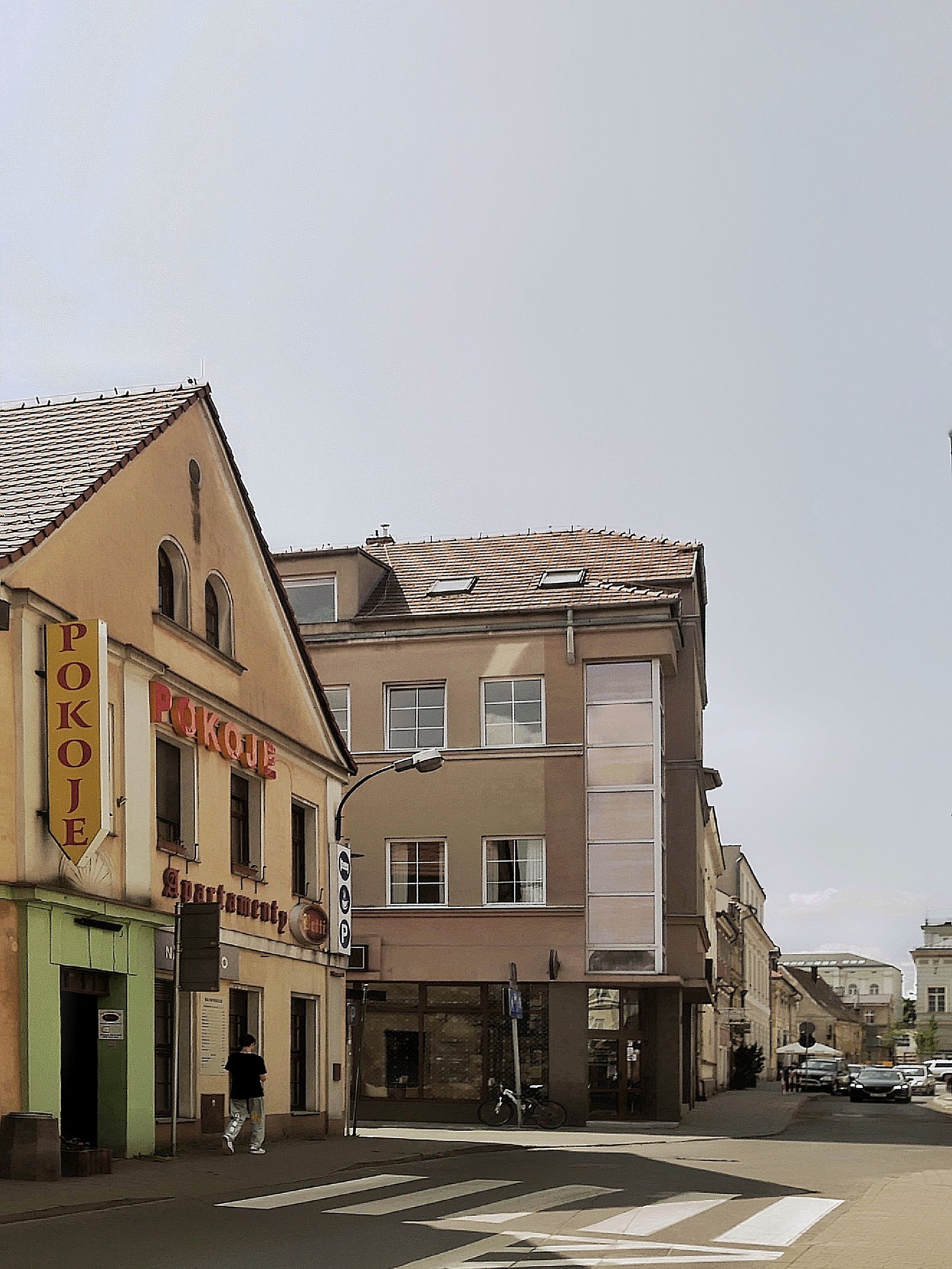 Buildings Along Empty Street in Town · Free Stock Photo
