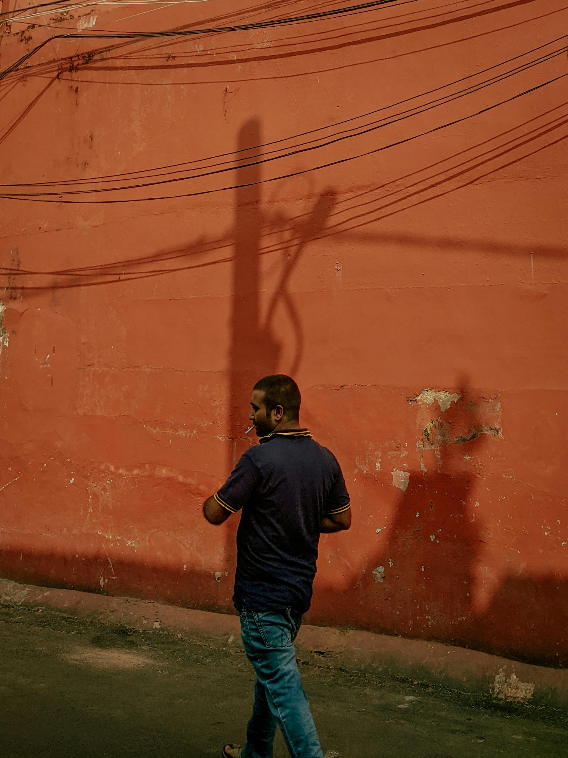 Man Walking Down Street · Free Stock Photo
