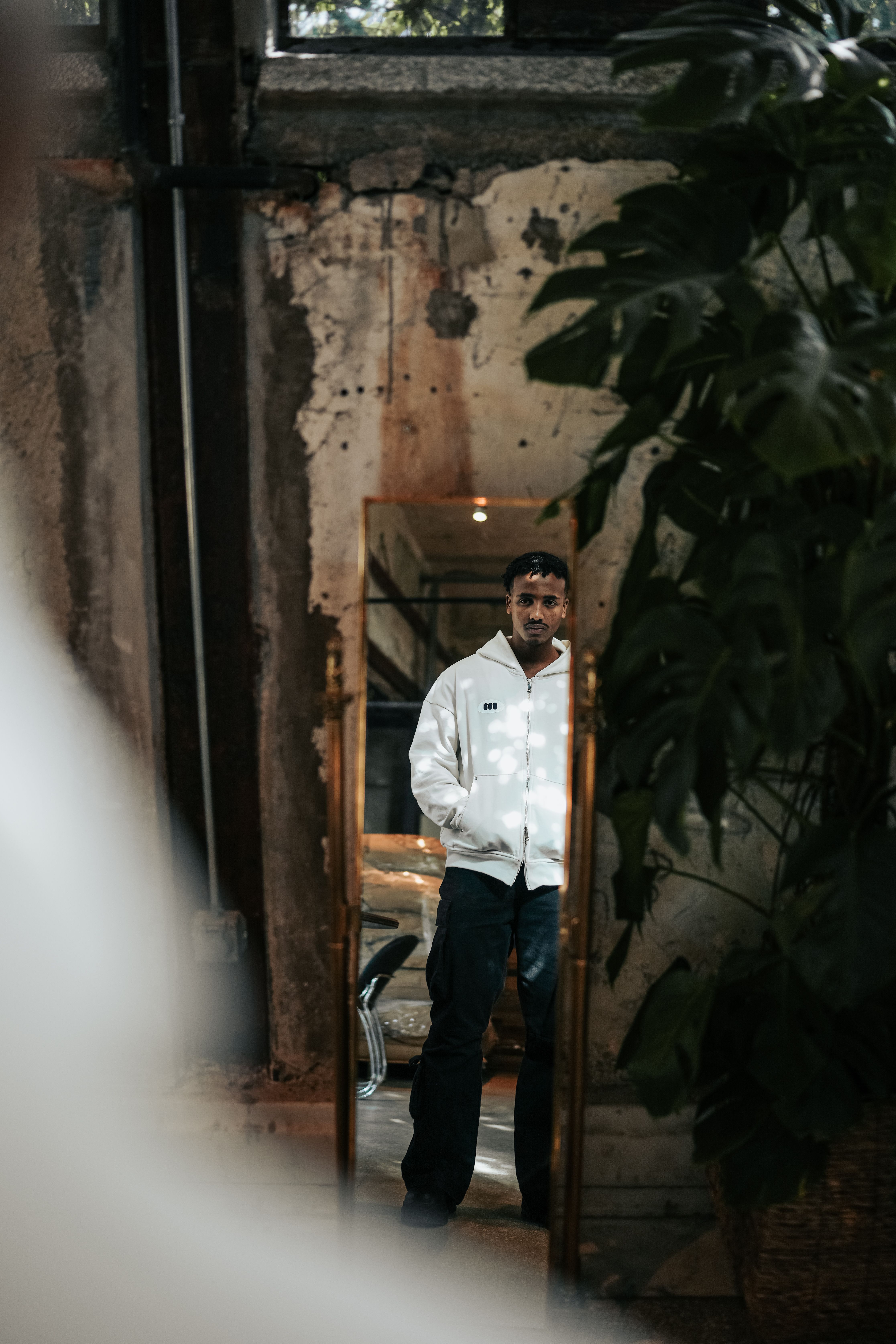 Cool Young Man Reflecting in the Mirror · Free Stock Photo