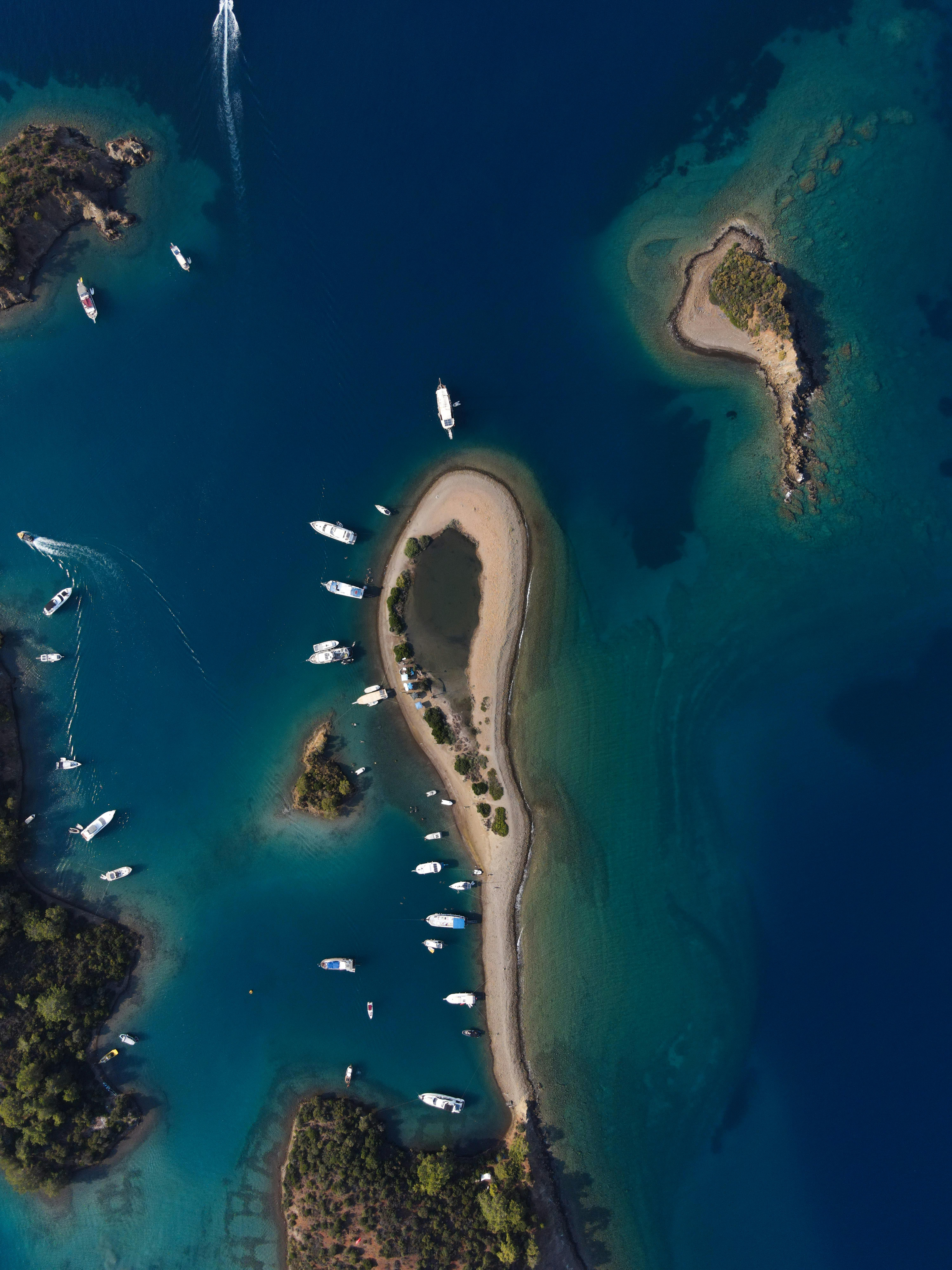 Birds Eye View of Islands with Motorboats near · Free Stock Photo