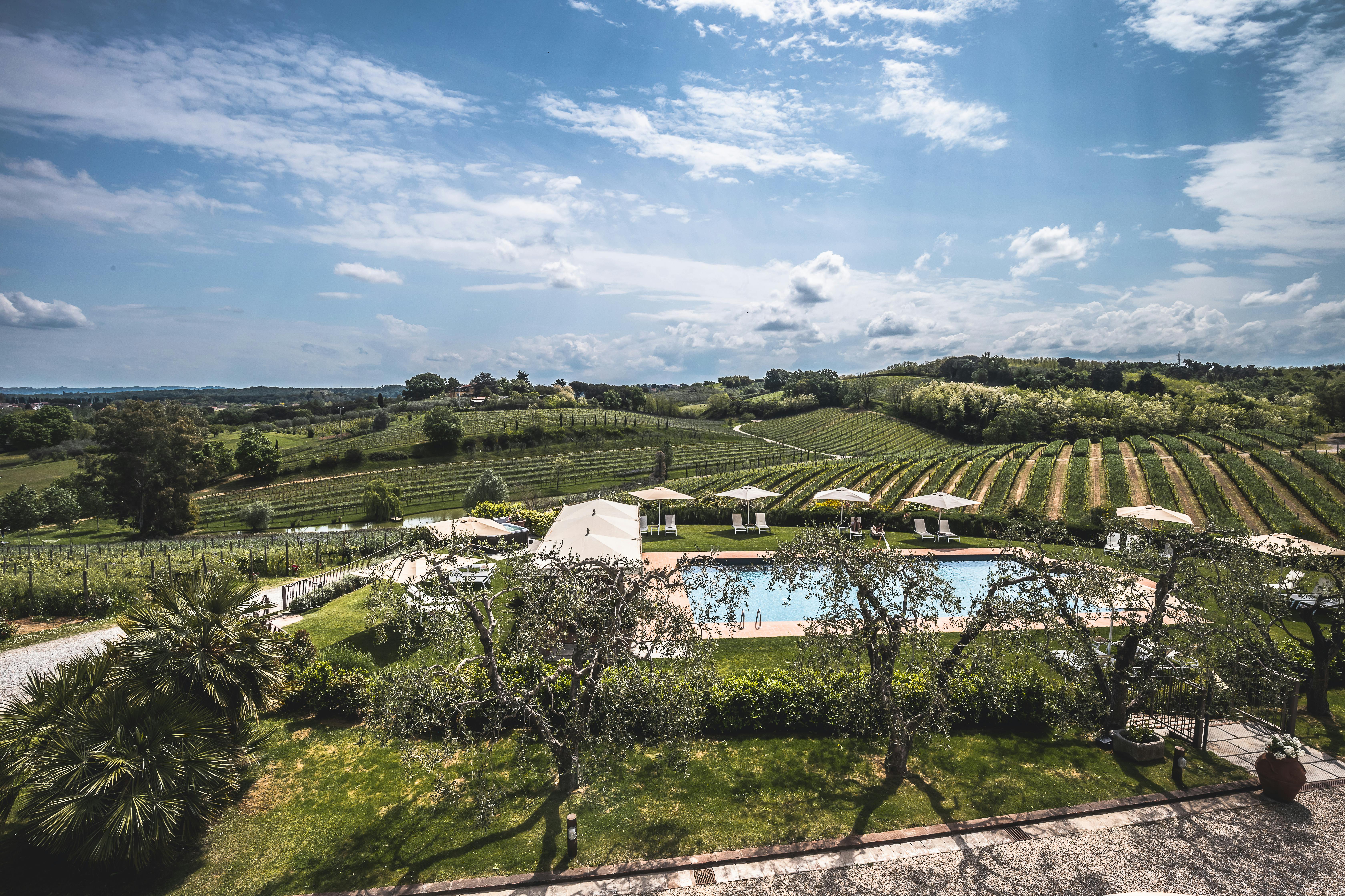 Outdoor Swimming Pool in a Scenic Rural Area · Free Stock Photo