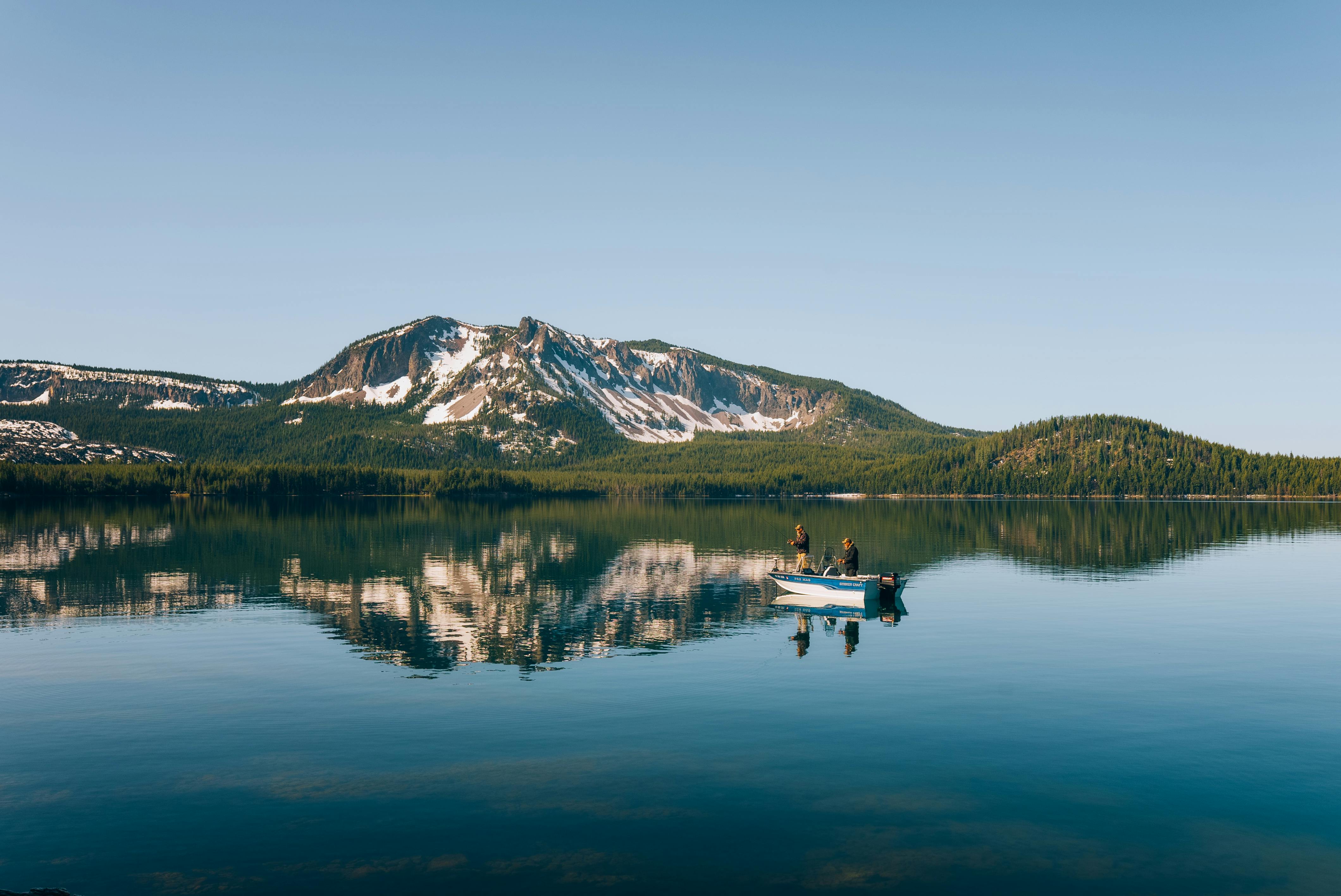 A Mountain Reflecting in a Calm Lake Surface · Free Stock Photo