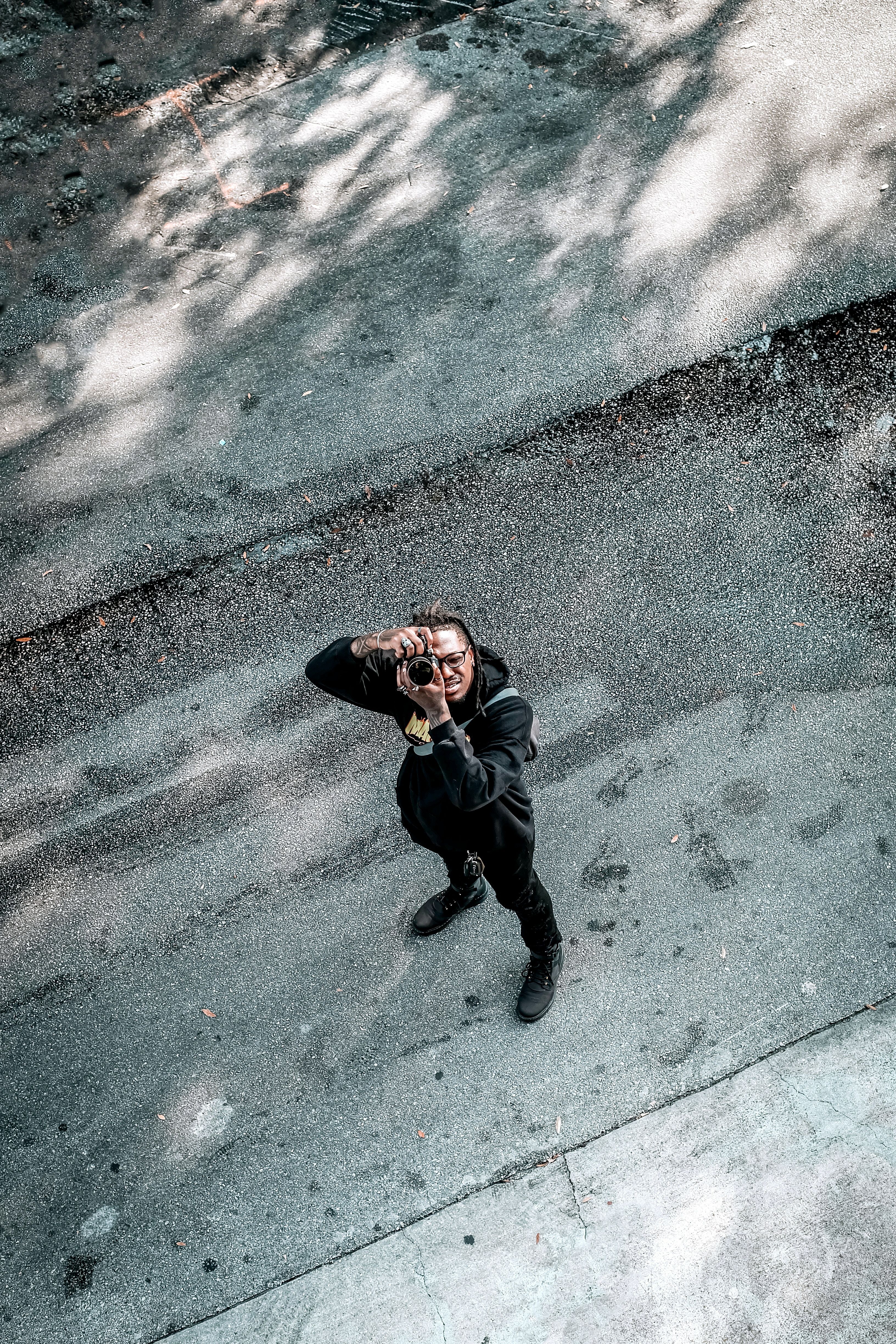 A person taking a photo from above · Free Stock Photo