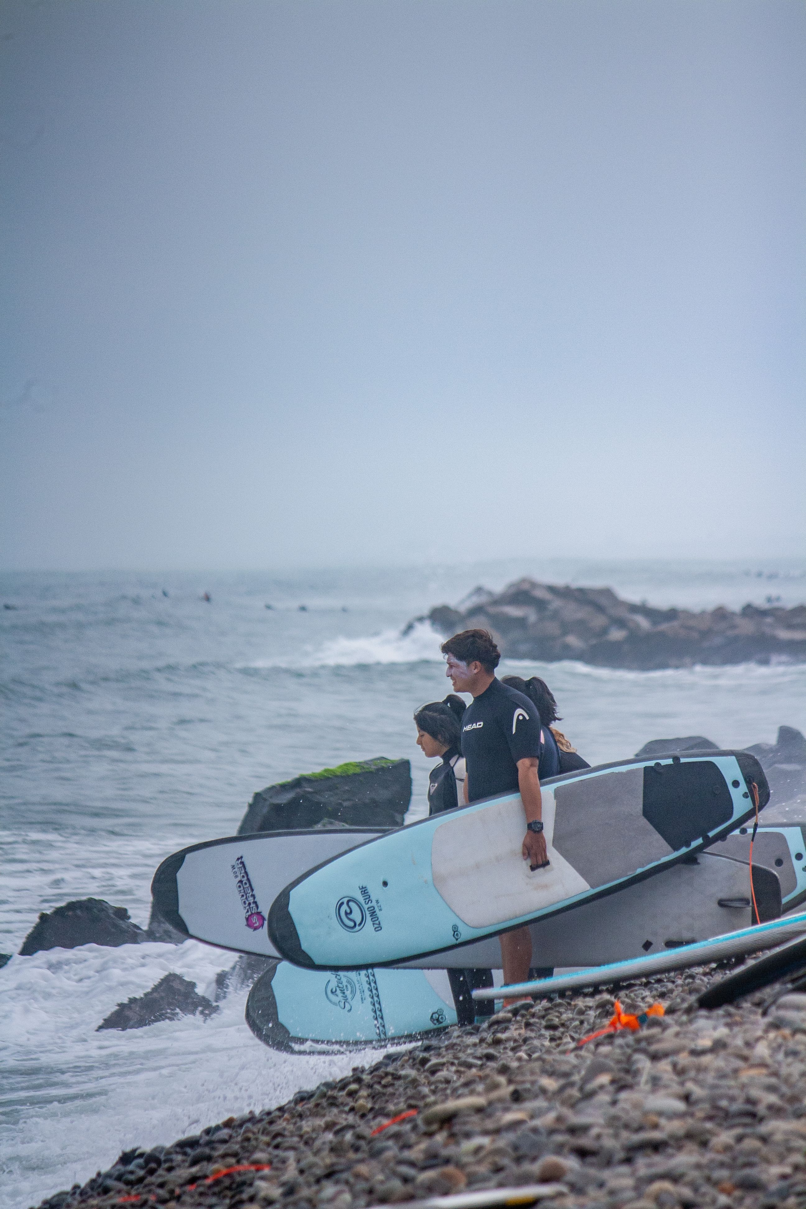 Surfer Walking Out of the Sea with a Surfboard under an Arm · Free ...