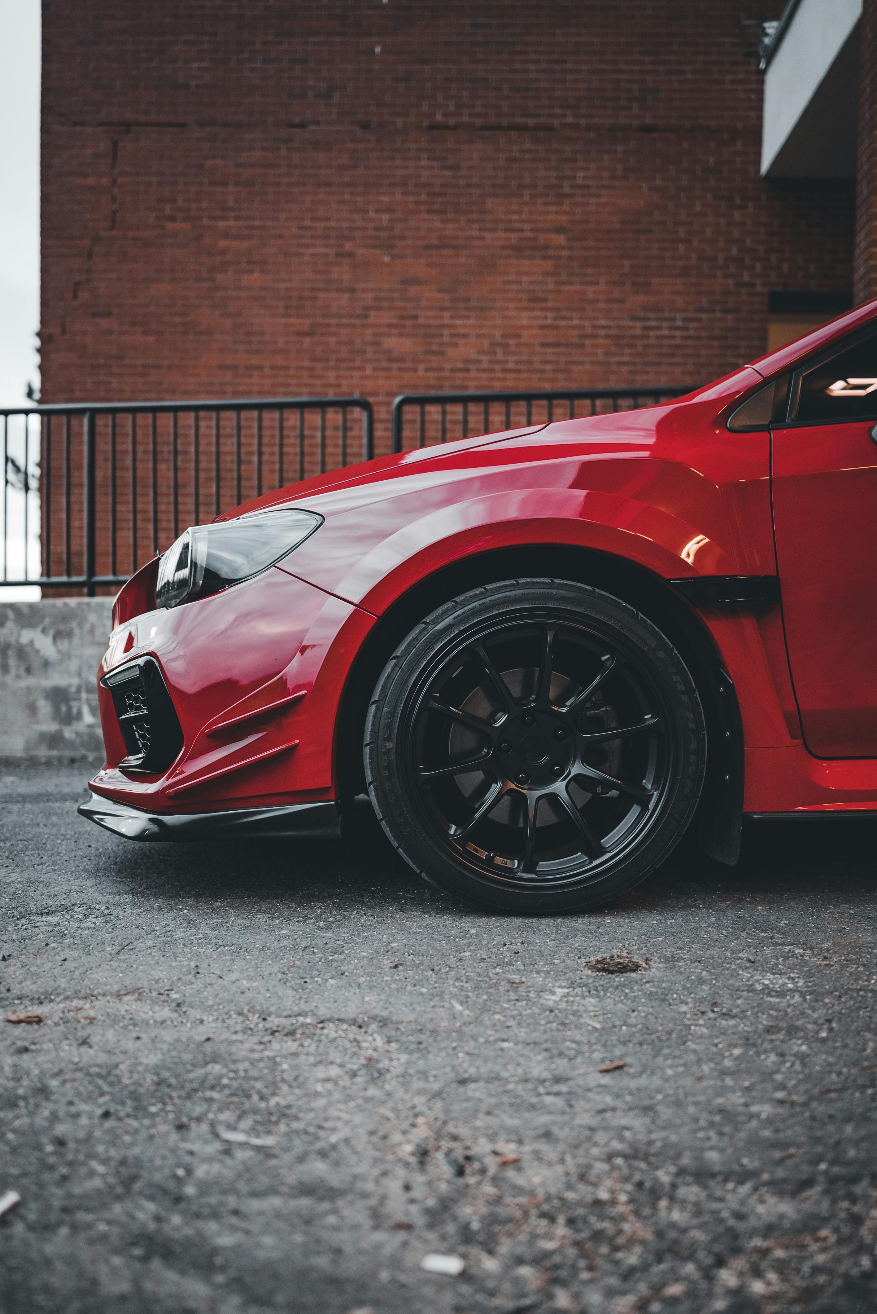 Red Subaru Impreza WRX with Black Wheels · Free Stock Photo