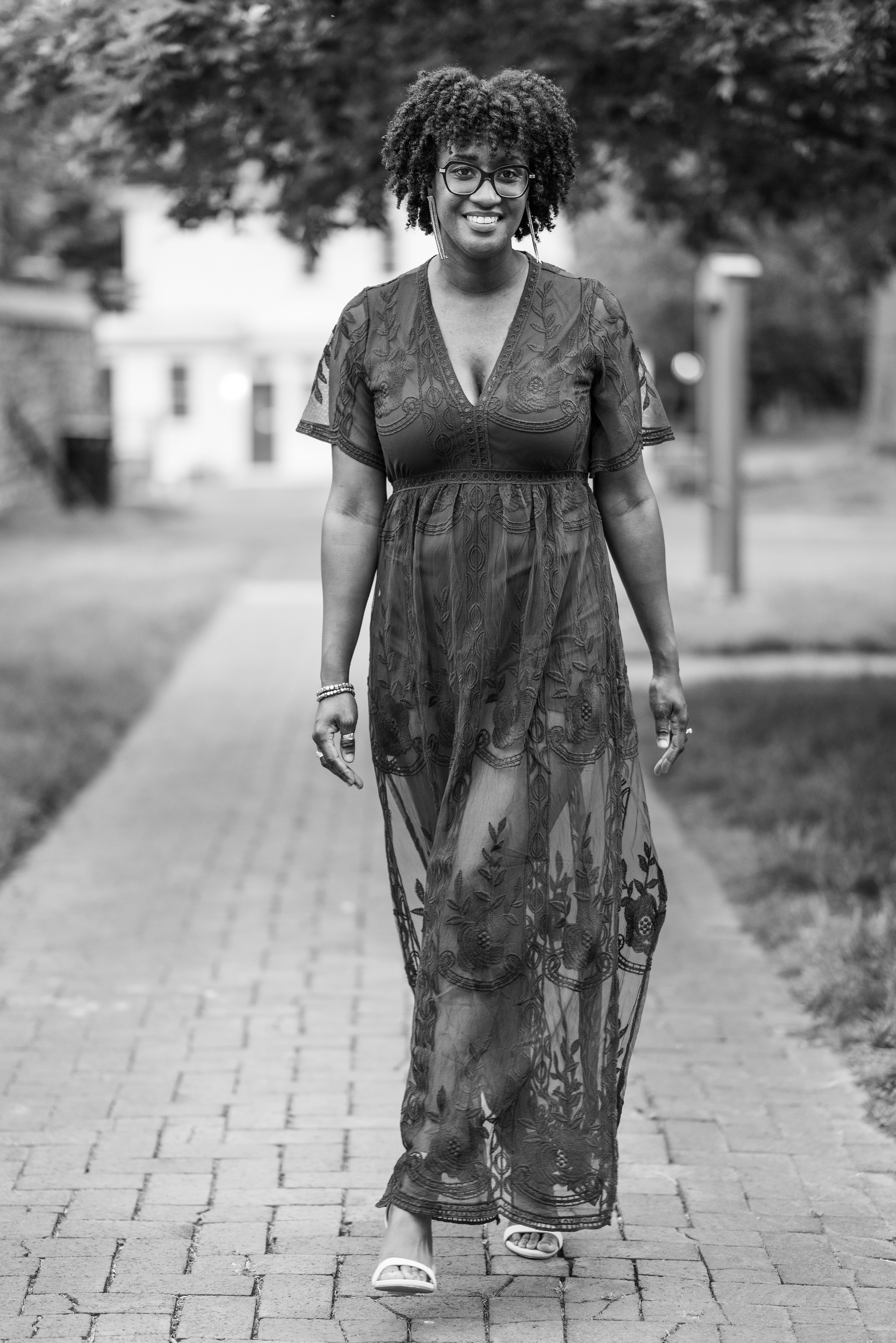 Woman on Paving Sidewalk Walking in Summer Dress · Free Stock Photo