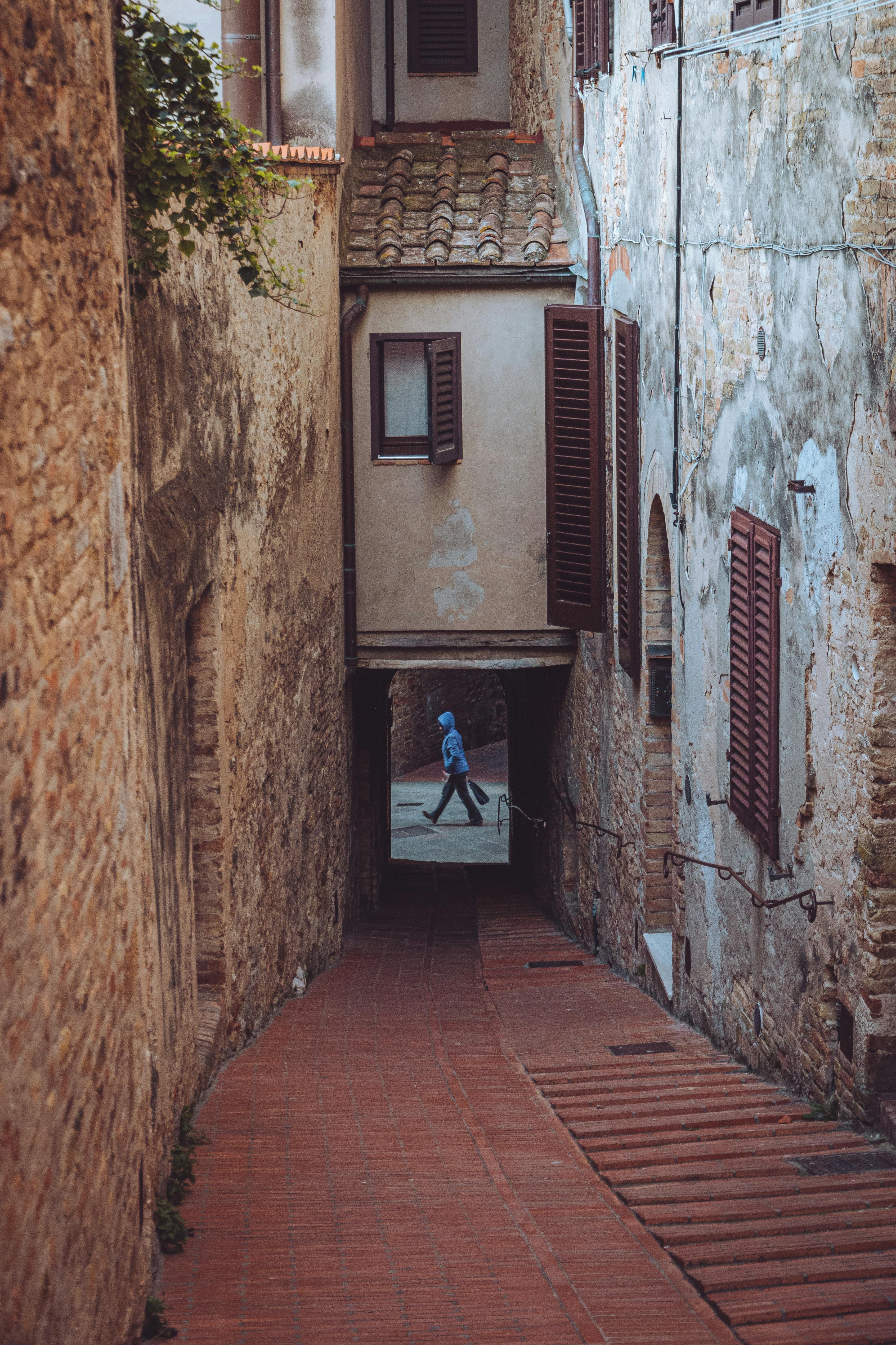 Photo of Empty Alley in Between Buildings · Free Stock Photo