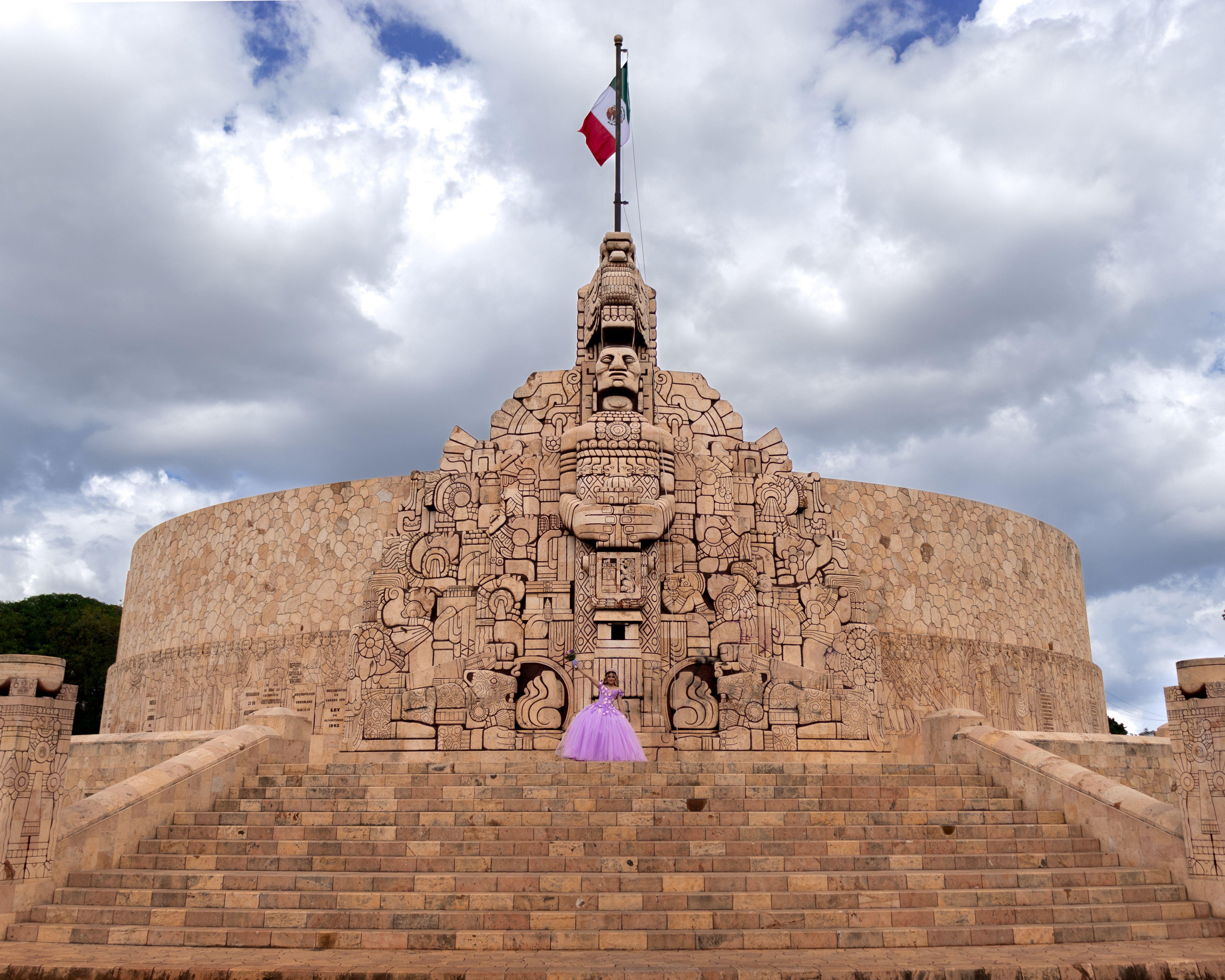 Woman in a Pink Ball Gown at the Monument to the Homeland in Merida ...