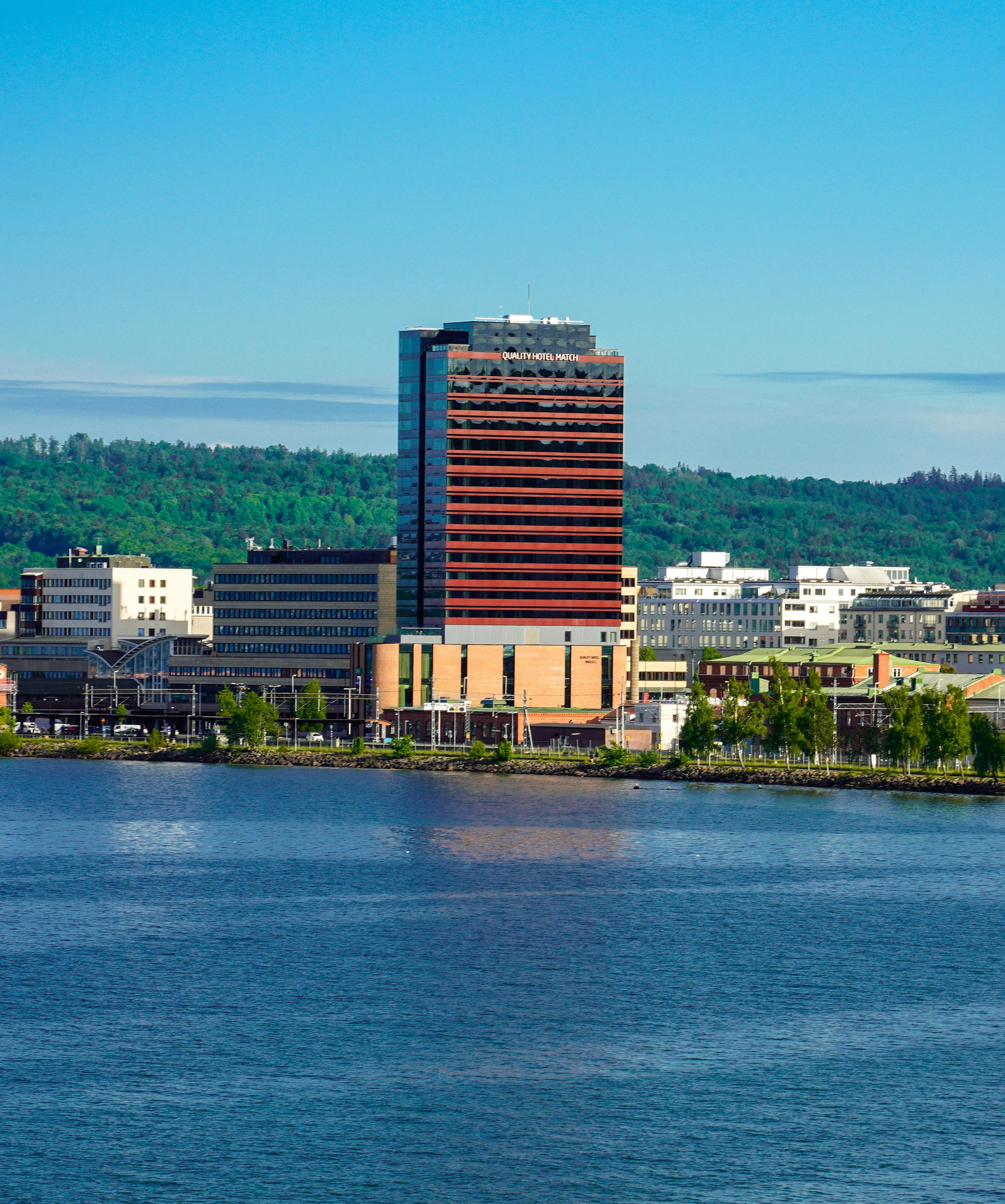 Buildings near River in Town · Free Stock Photo