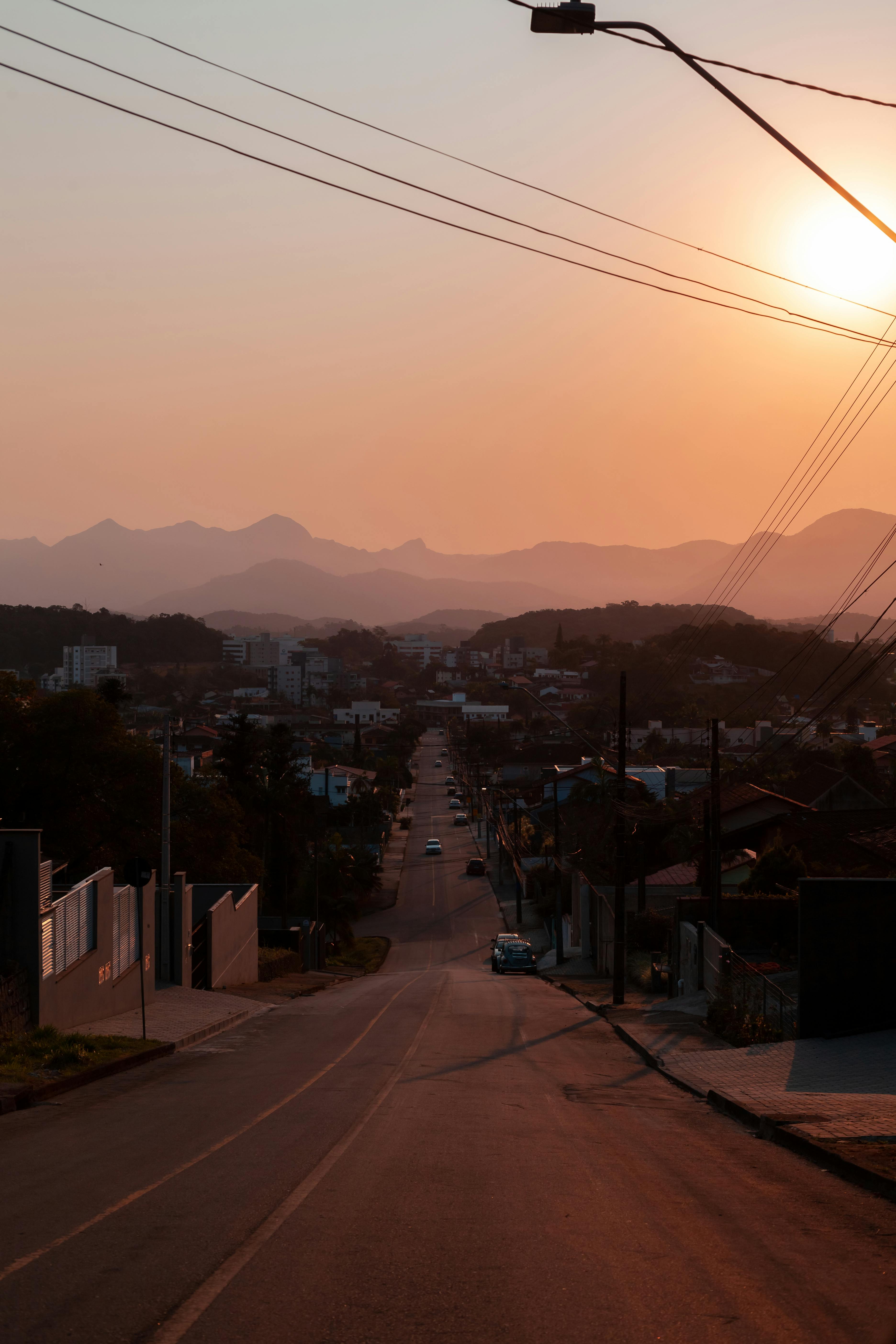 Street on Hill in Town at Sunset · Free Stock Photo