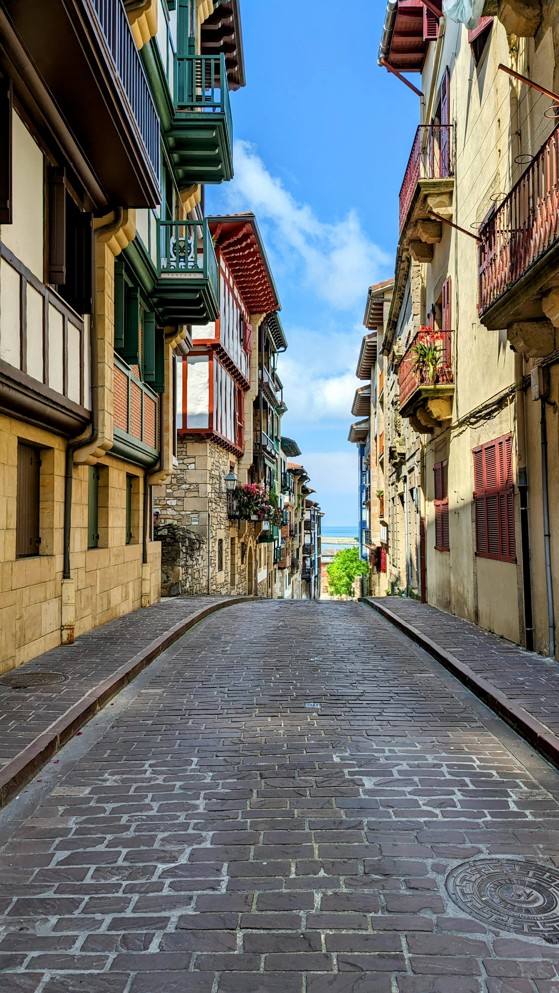 Narrow Paved Street in a City · Free Stock Photo