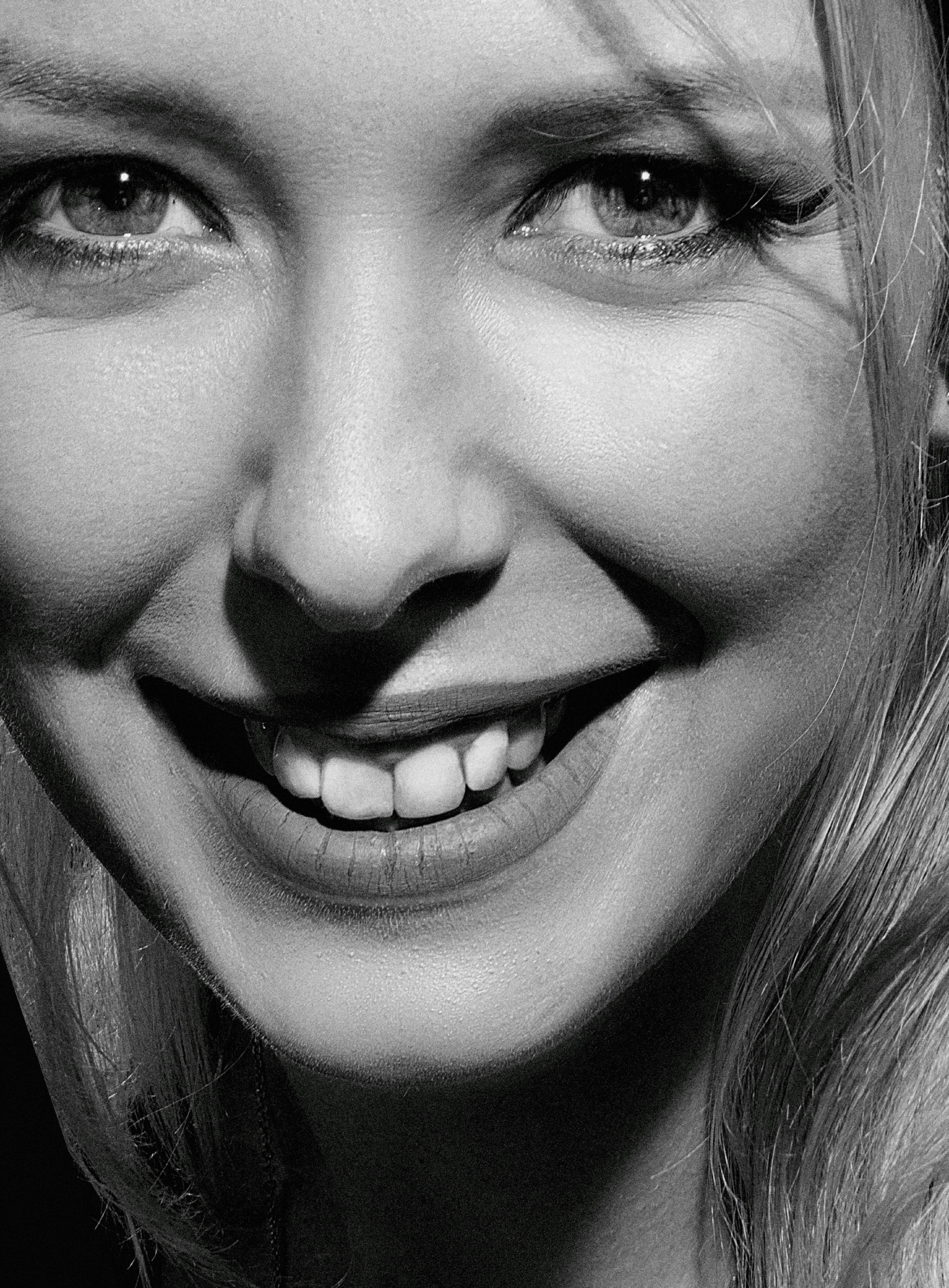 Smiling Woman in Black and White · Free Stock Photo