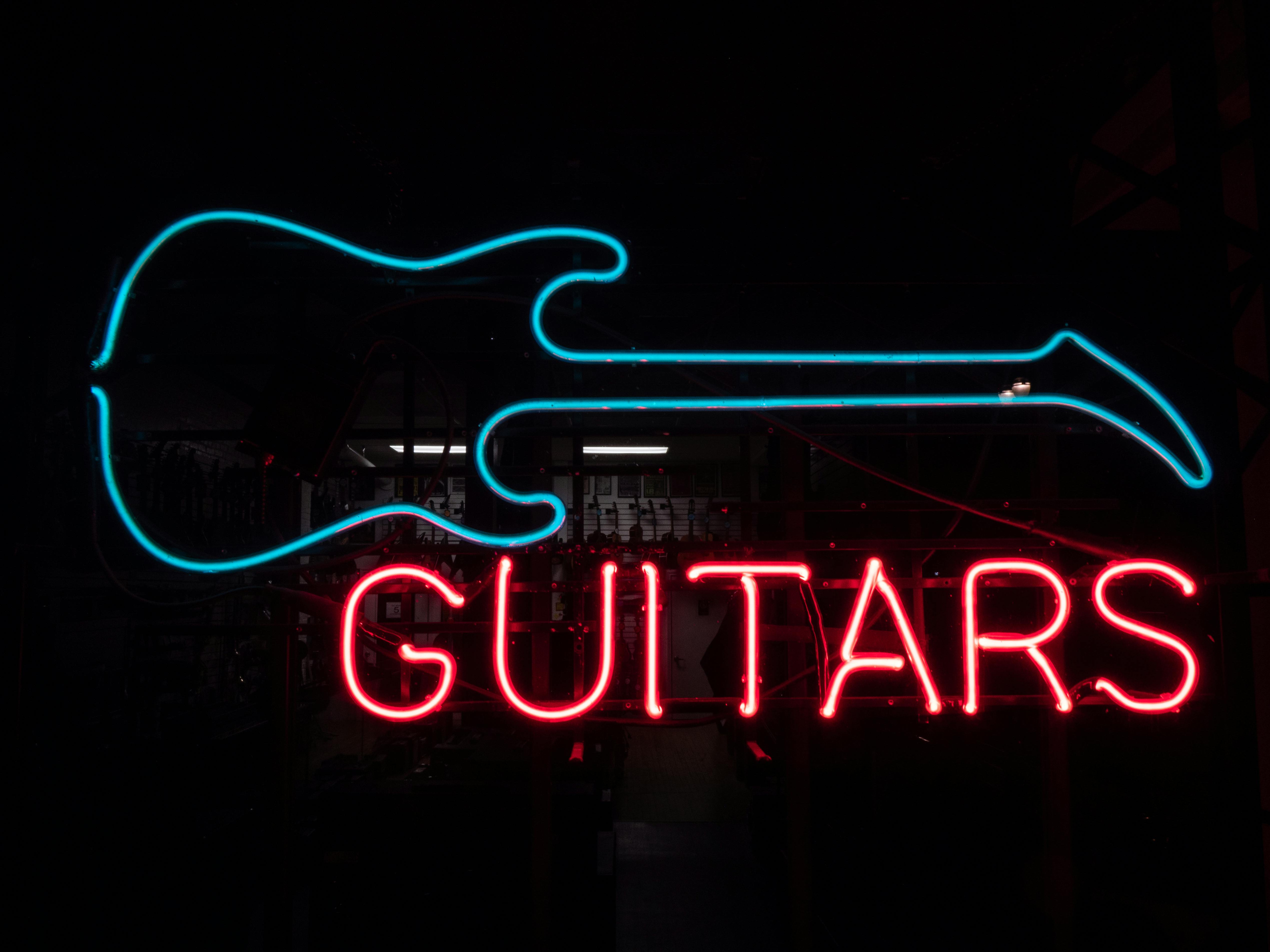 Neon Guitar sign · Free Stock Photo