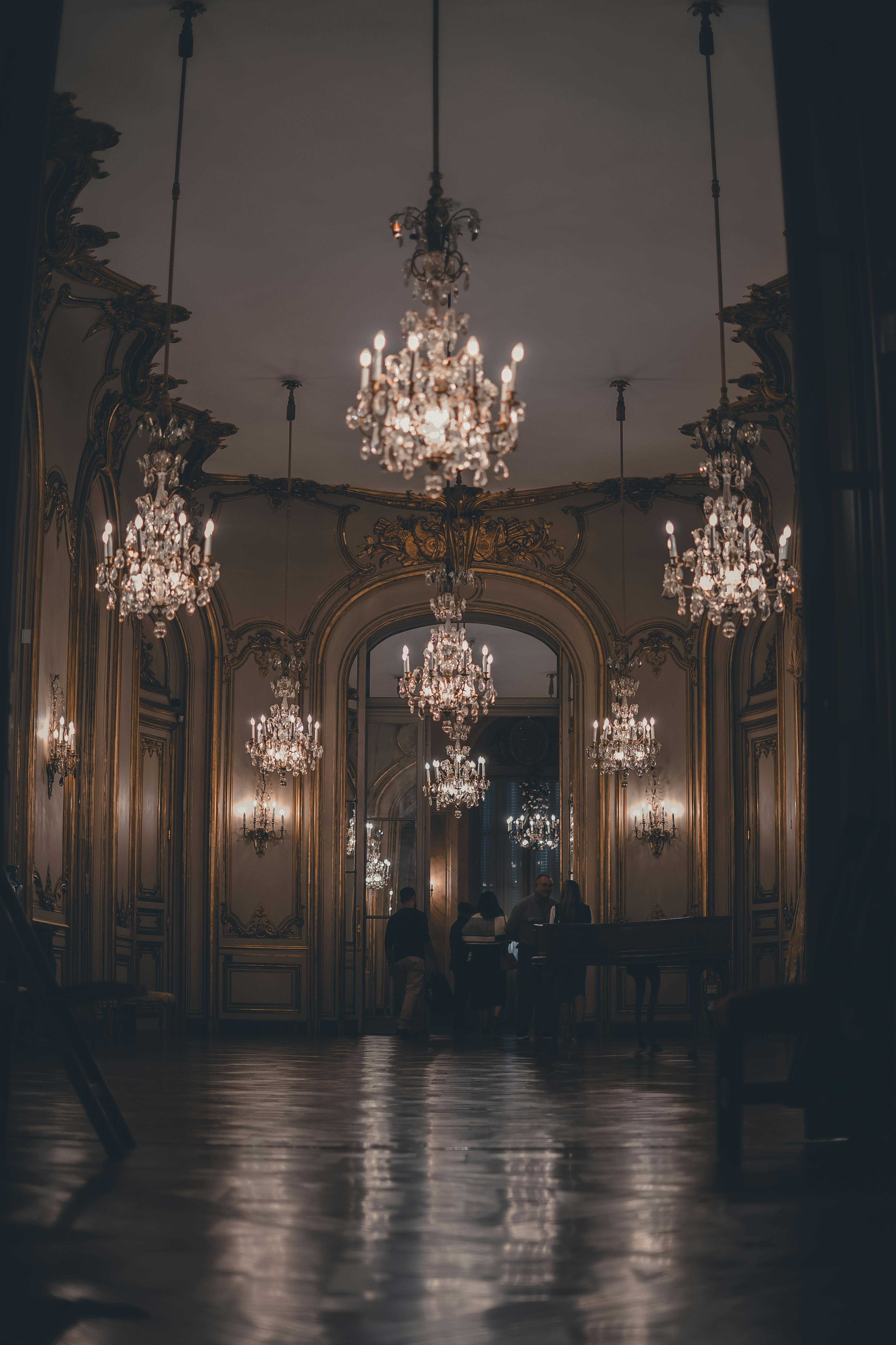 Dark Palace Interior with Chandeliers · Free Stock Photo